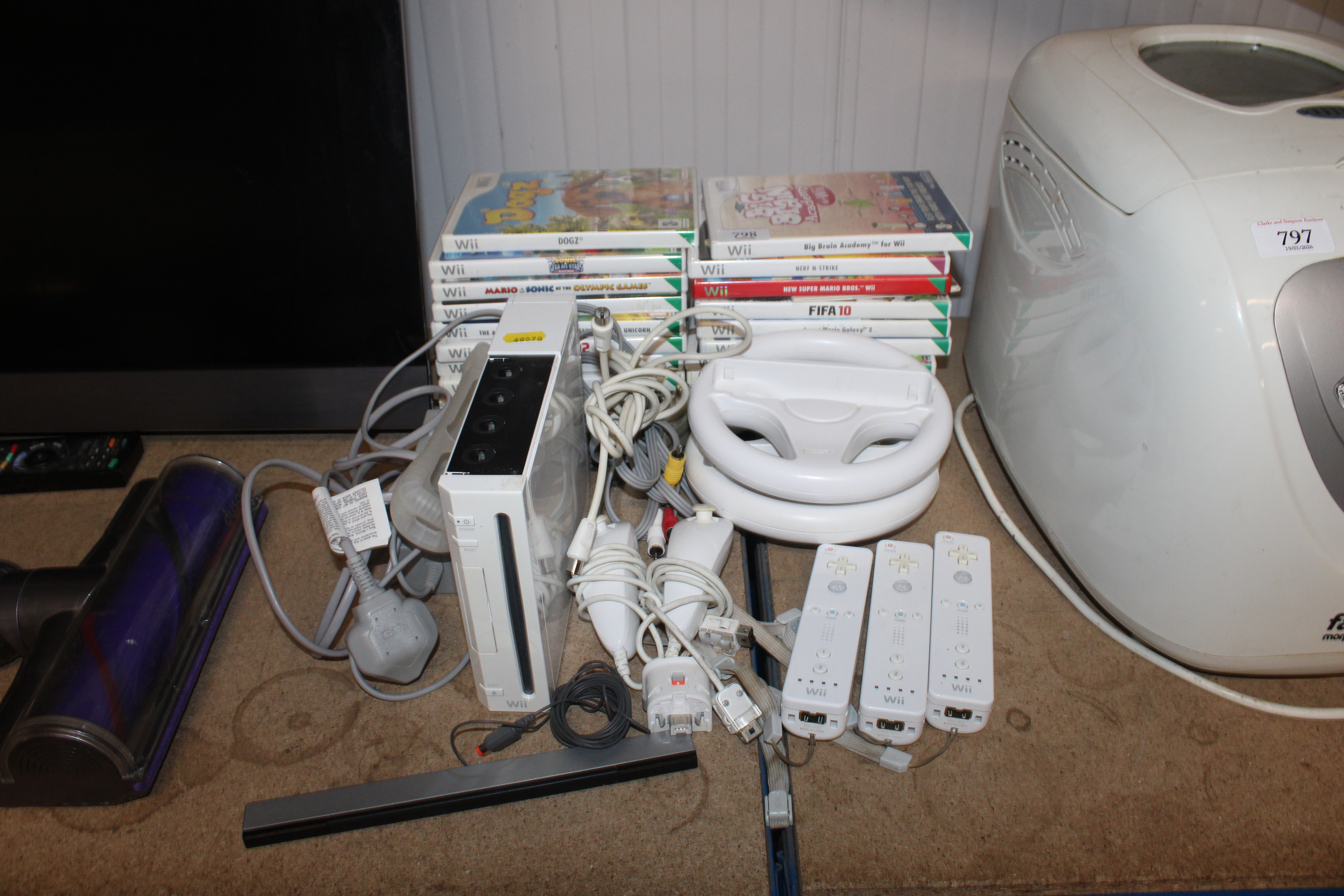 A Nintendo Wii together with various accessories sold as seen