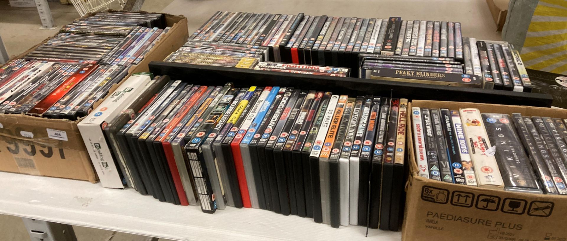 Contents to part of rack, approximately 160 DVDs and DVD box sets ...