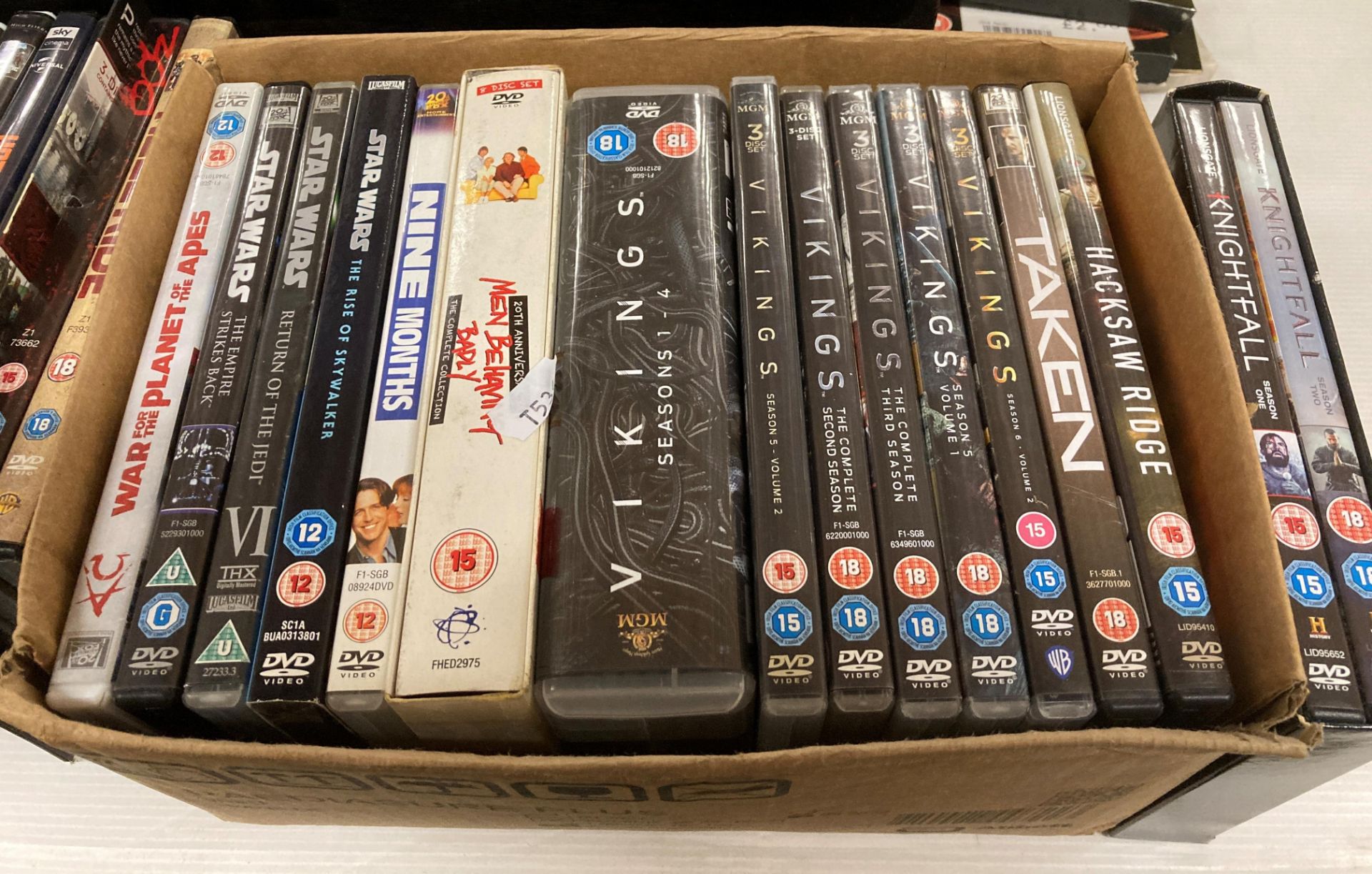 Contents to part of rack, approximately 160 DVDs and DVD box sets ...