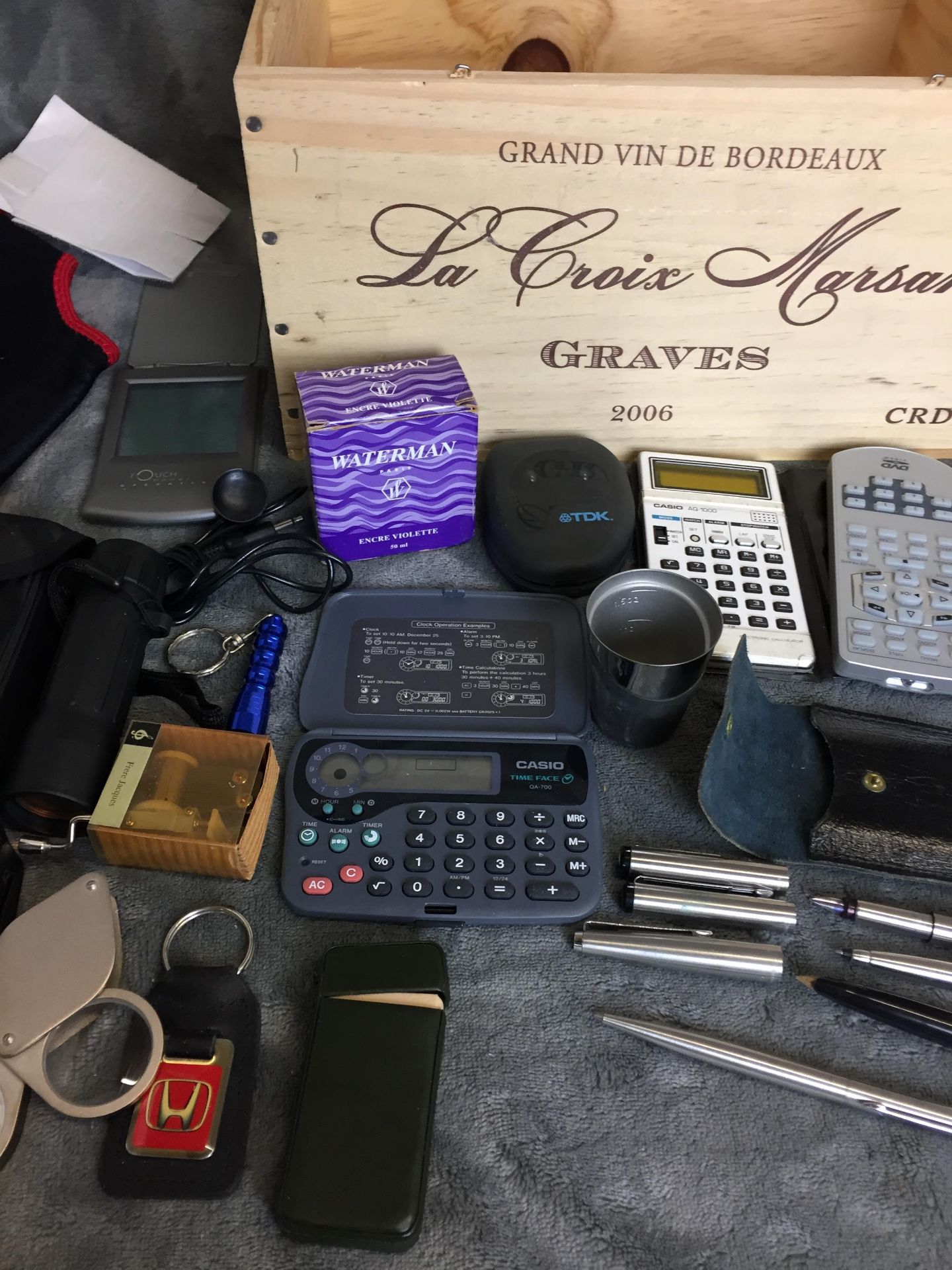 Twenty-six items including four parker pens, music box mechanism ...