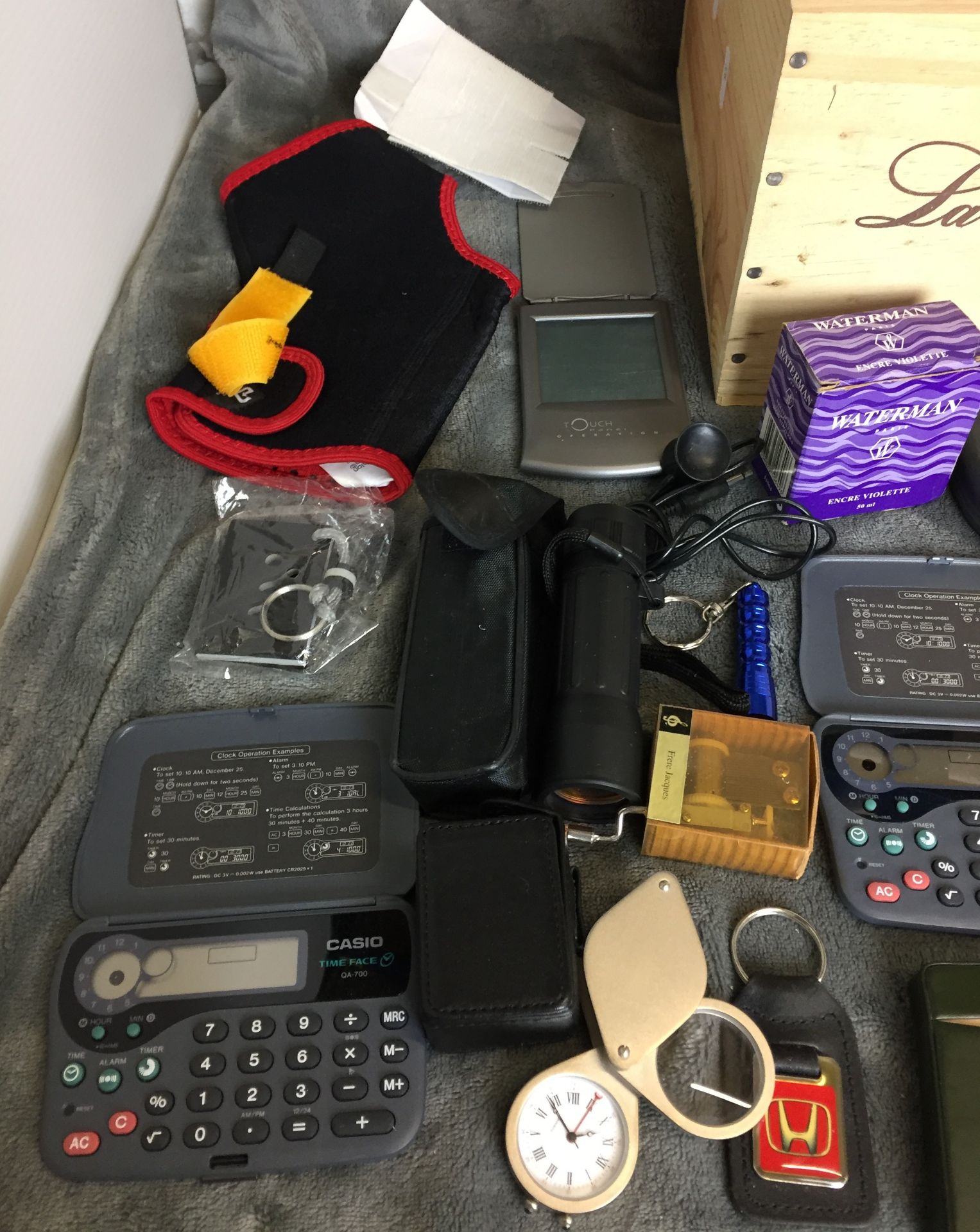 Twenty-six items including four parker pens, music box mechanism ...