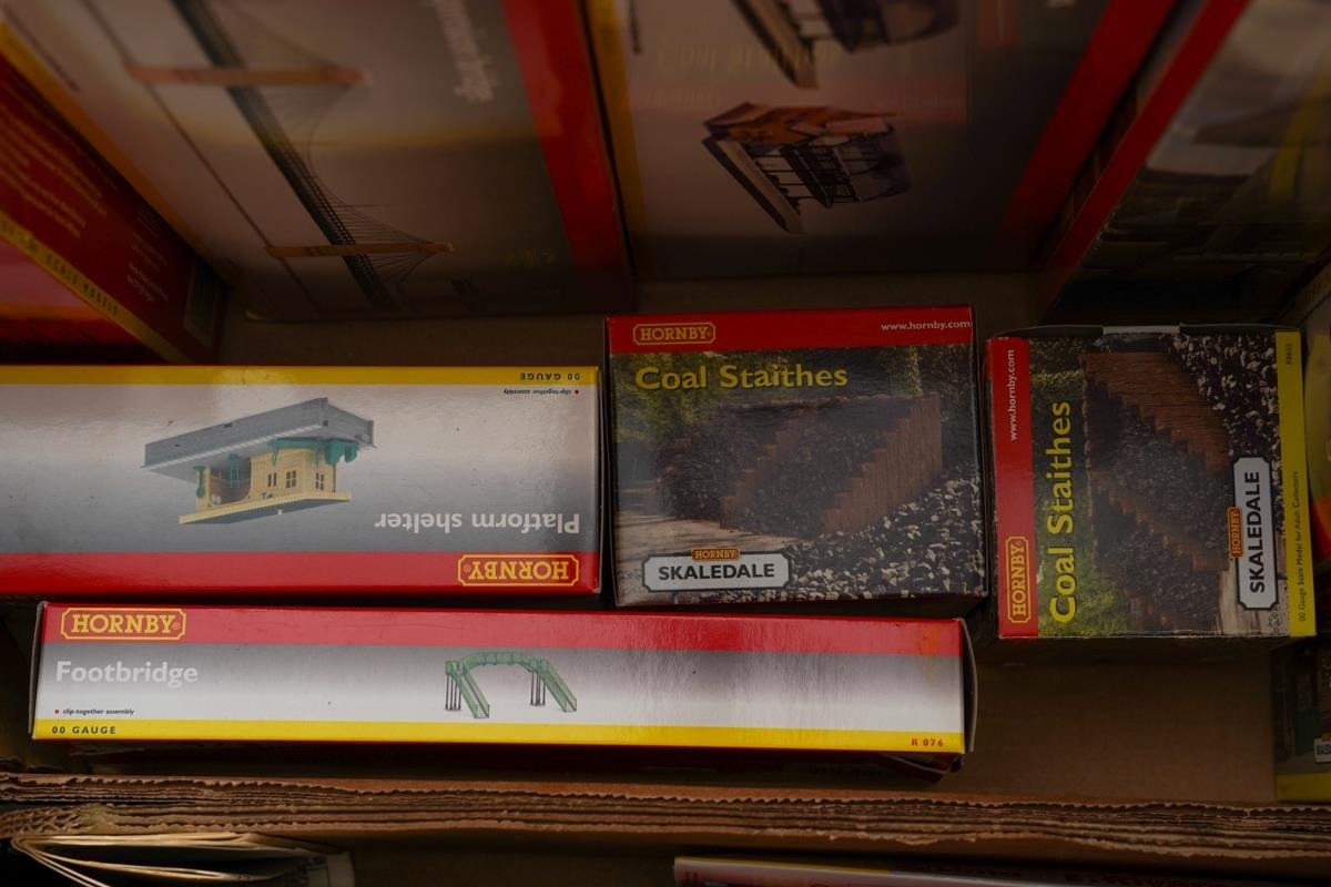 Two boxes of boxed Hornby Railways 00 gauge layout models ...