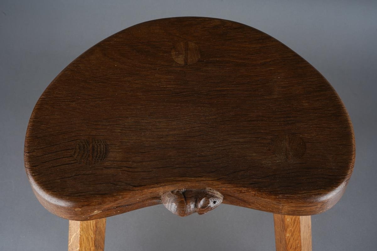 A Mouseman Robert Thompson of Kilburn oak three legged milking stool ...