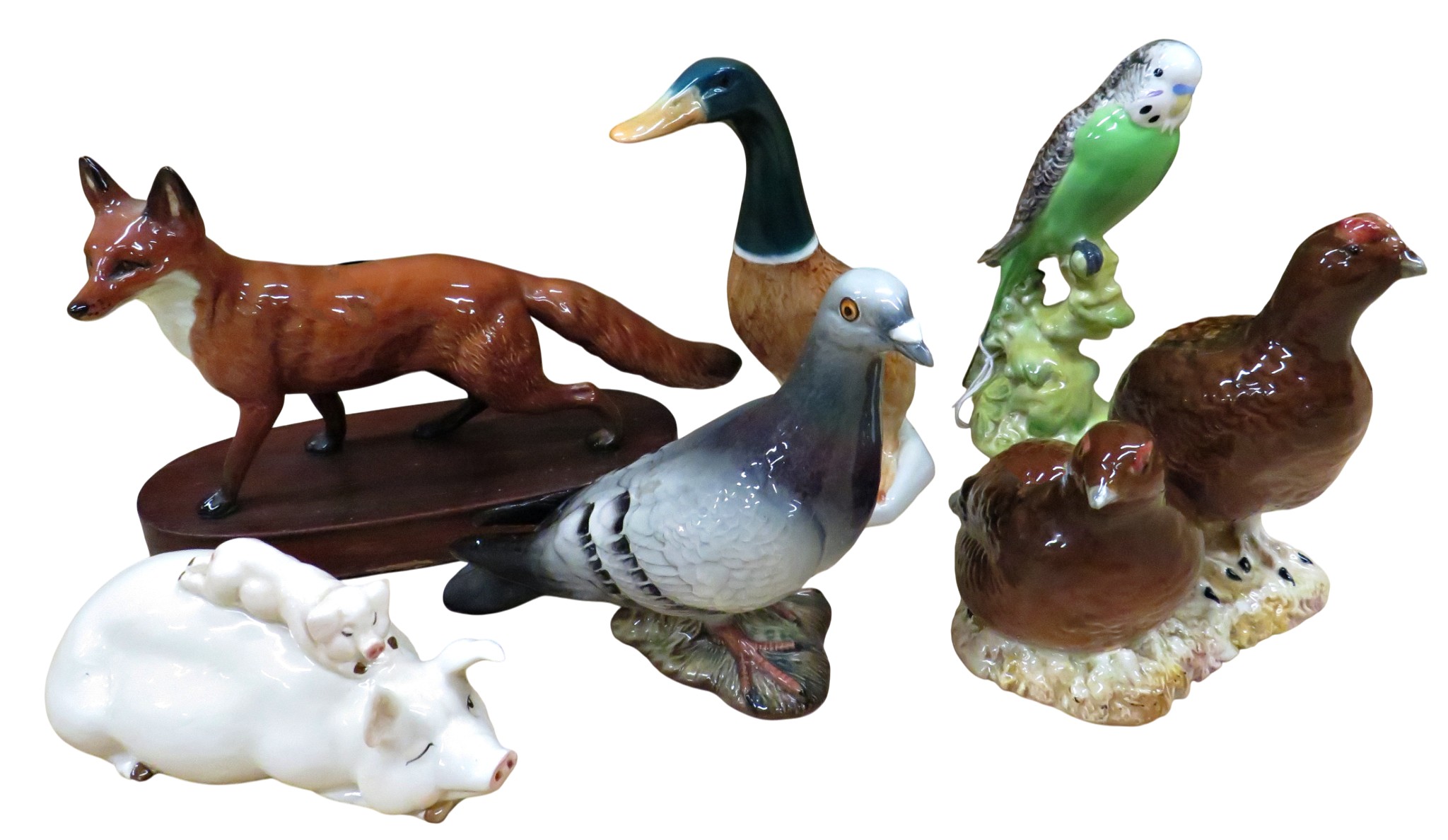 A collection of various Beswick and Doulton porcelain animals to ...