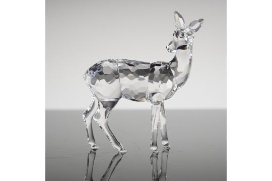 A Swarovski Crystal Doe figurine, identified by the stock number 247963 ...
