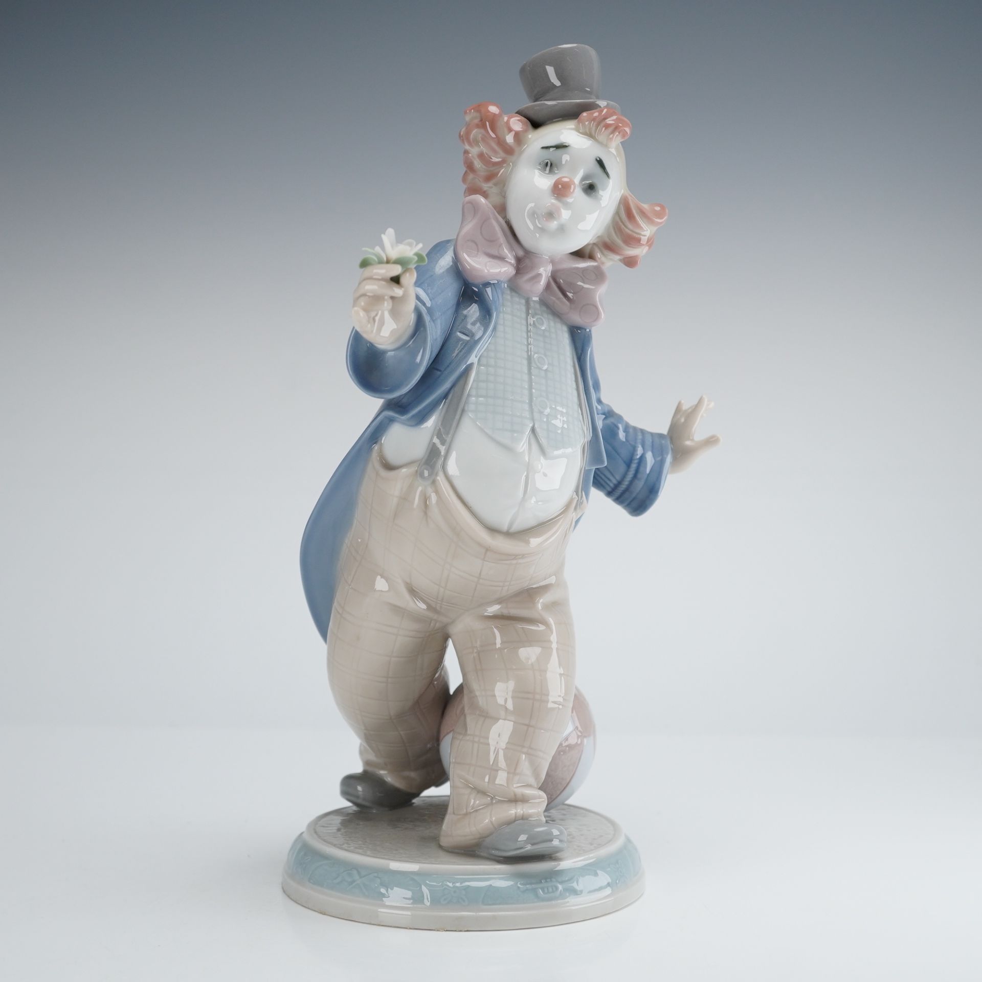 This is a Lladro porcelain figurine, titled "For A Smile," model number ...