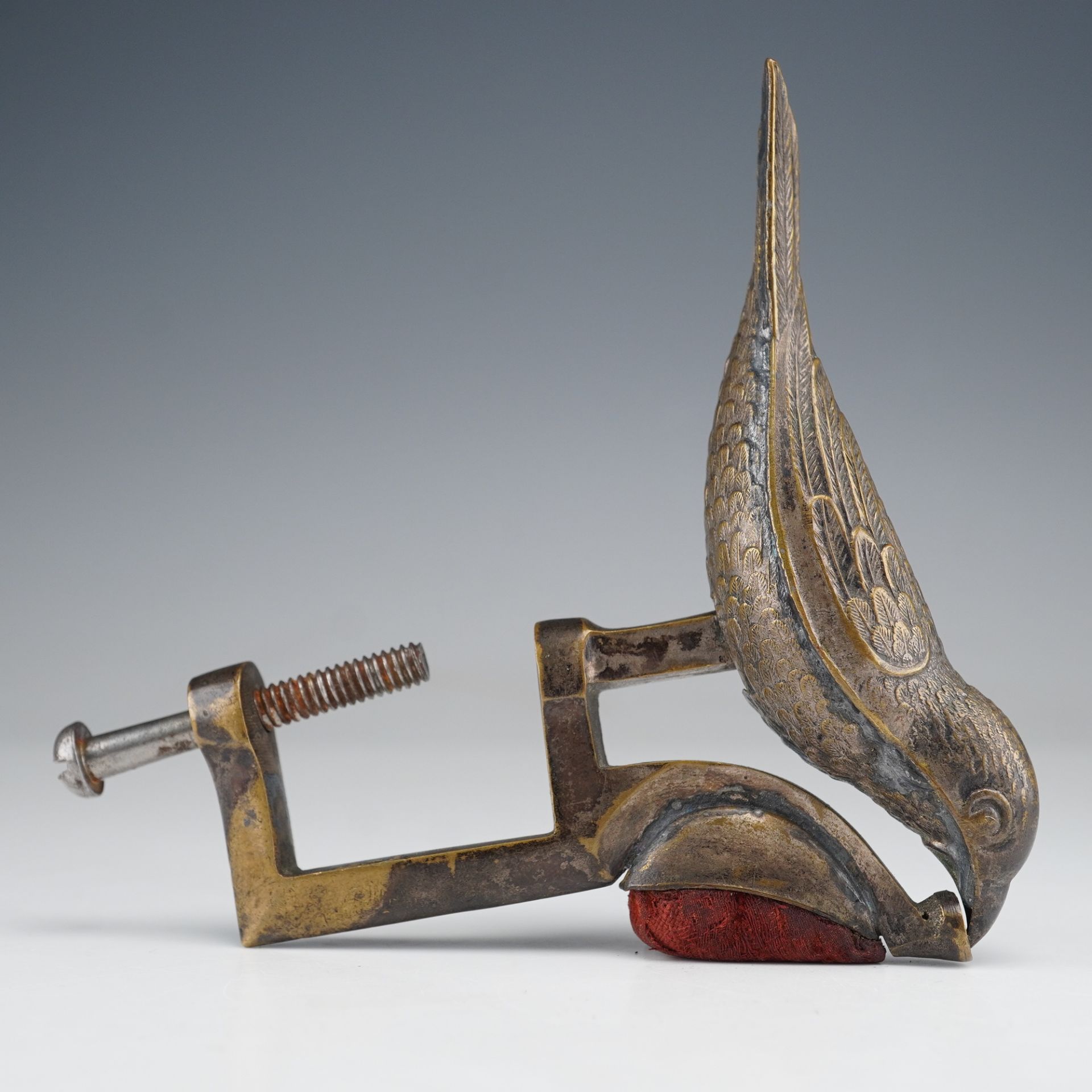 A Victorian-era clamp'on sewing bird with patinated brass construction ...
