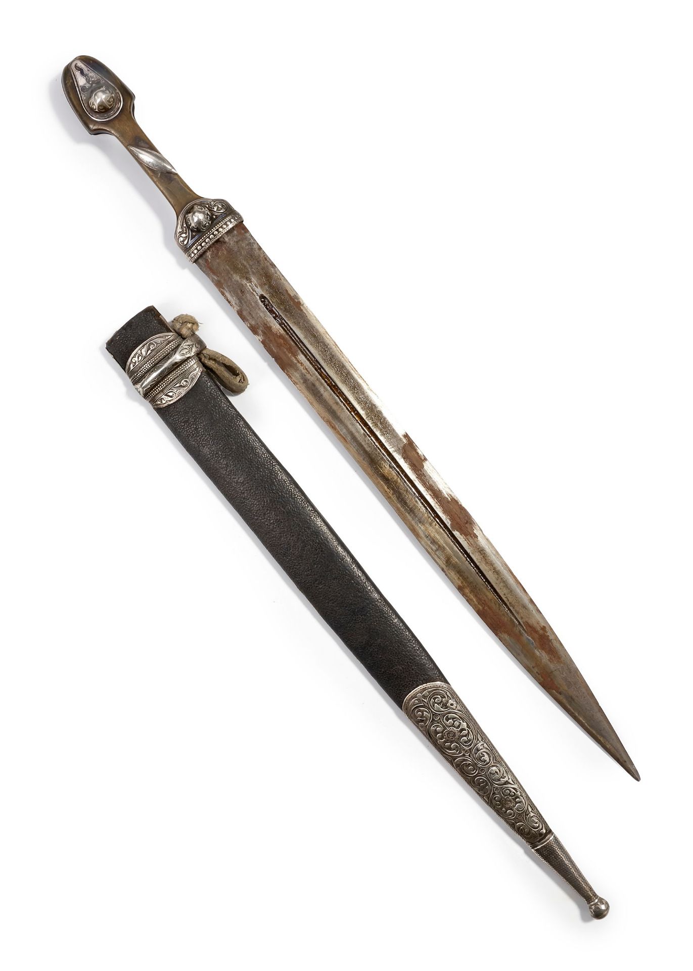 A Caucasian kindjal with steel blade and niello silver mounts. The hilt ...