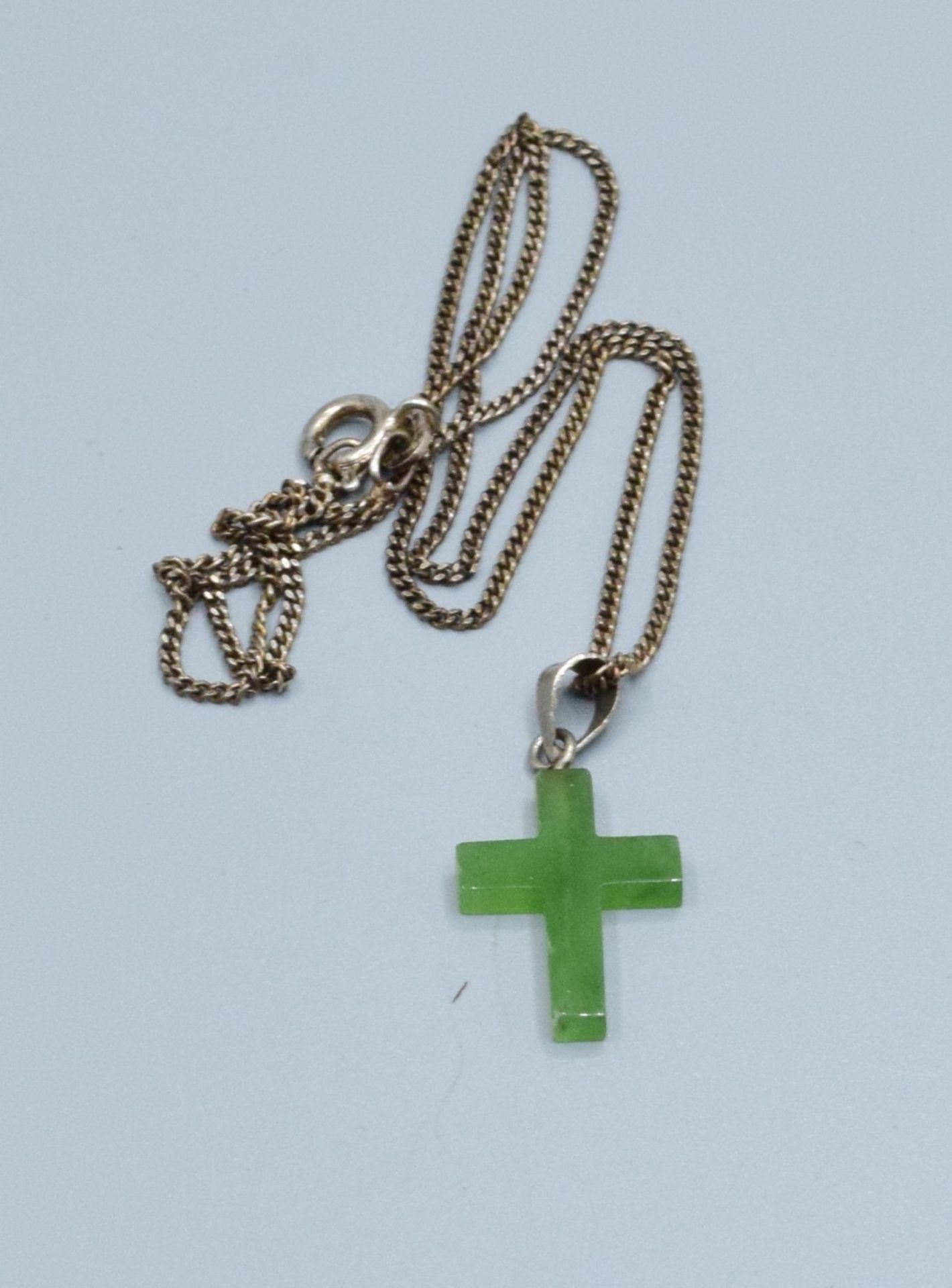 Of religious interest 925 silver jade small cross on a 925 silver neck ...