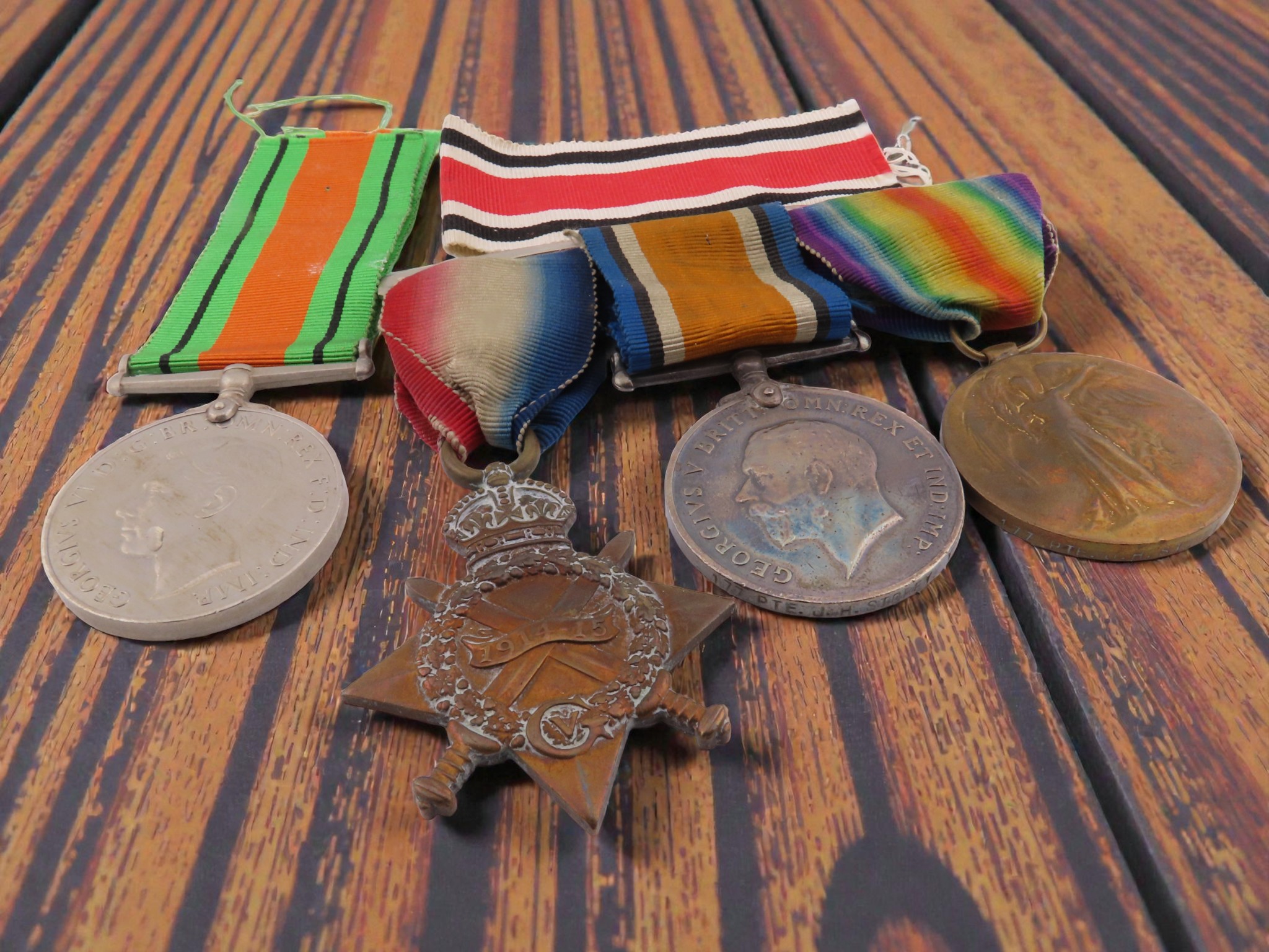 A First World War medal group awarded to 177 Private J H Storey York ...