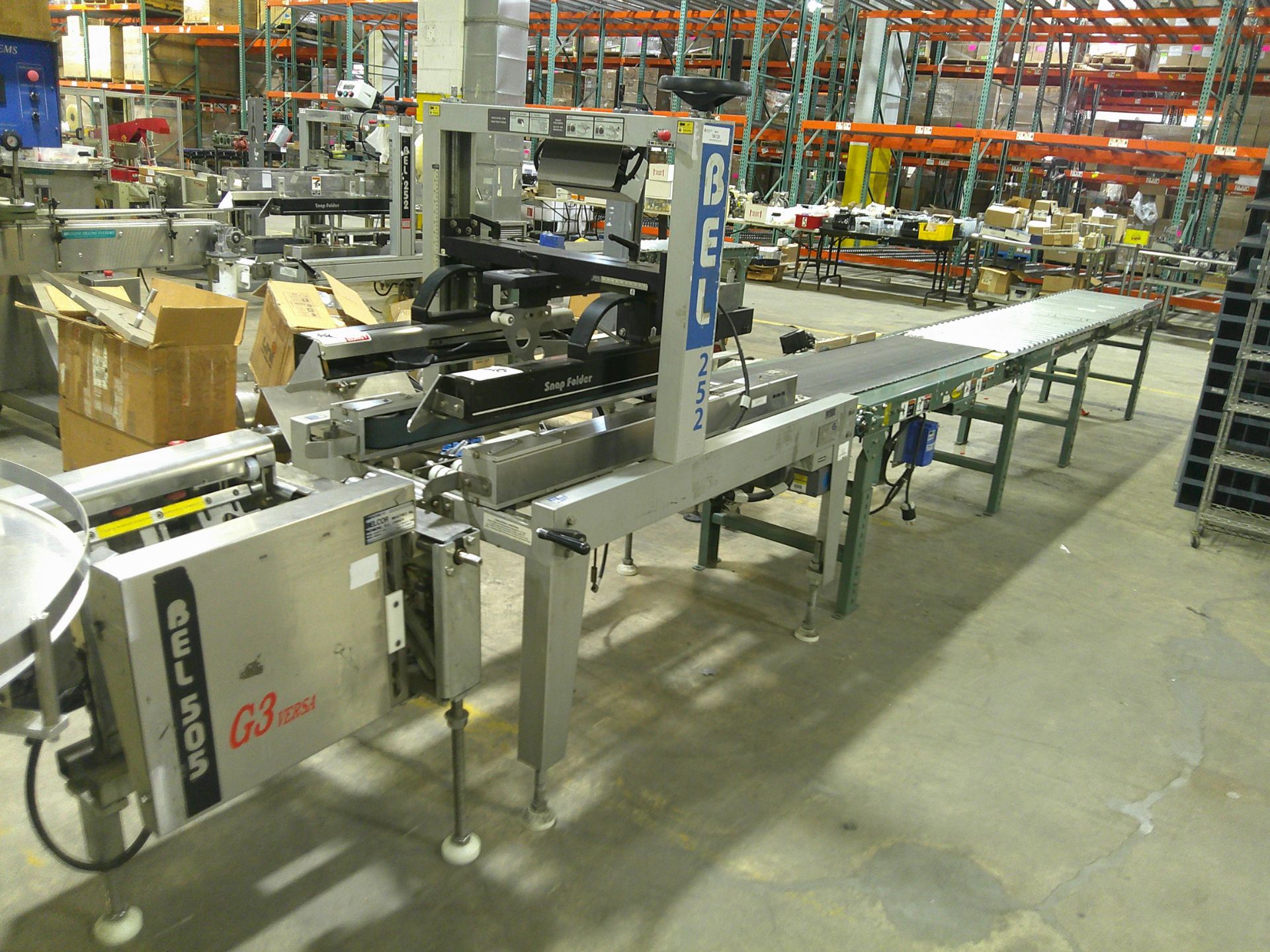 Bel 505 G3 Versa and Bel 252 boxing units with belt/roller conveyor ...