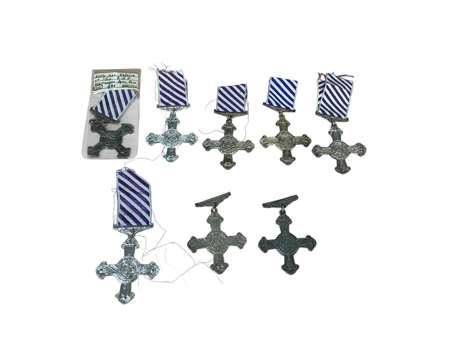 Collection of eight replica / copy Distinguished Flying Cross medals, (8).