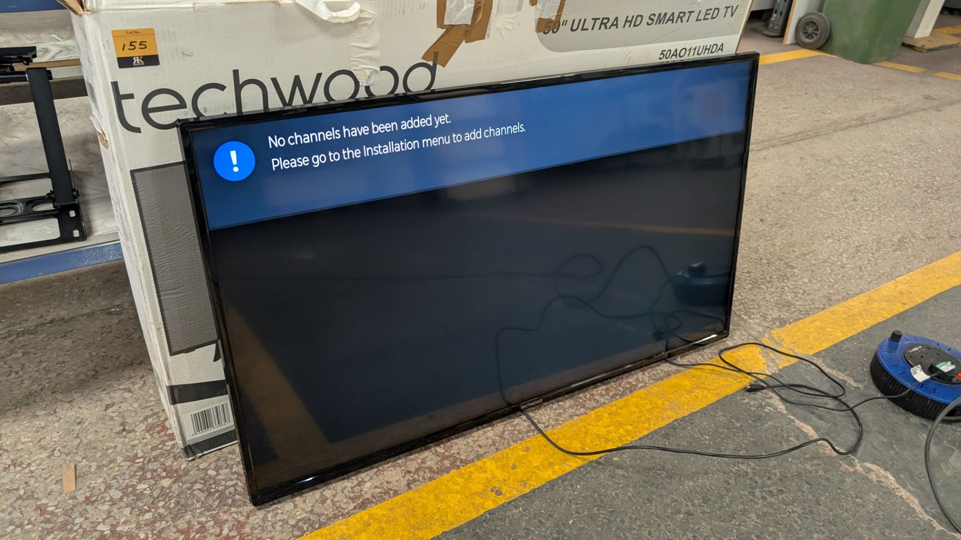 Techwood 50" Ultra HD Smart LED TV. Model: 50A011UHDA. Power cable and ...
