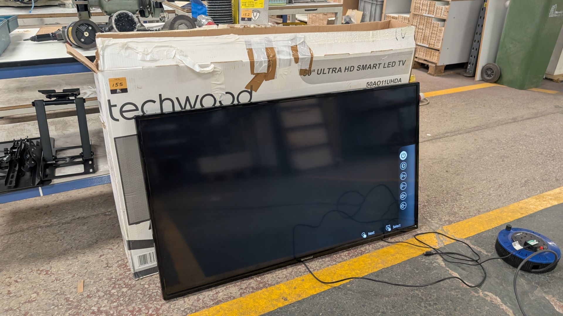 Techwood 50" Ultra HD Smart LED TV. Model: 50A011UHDA. Power cable and ...