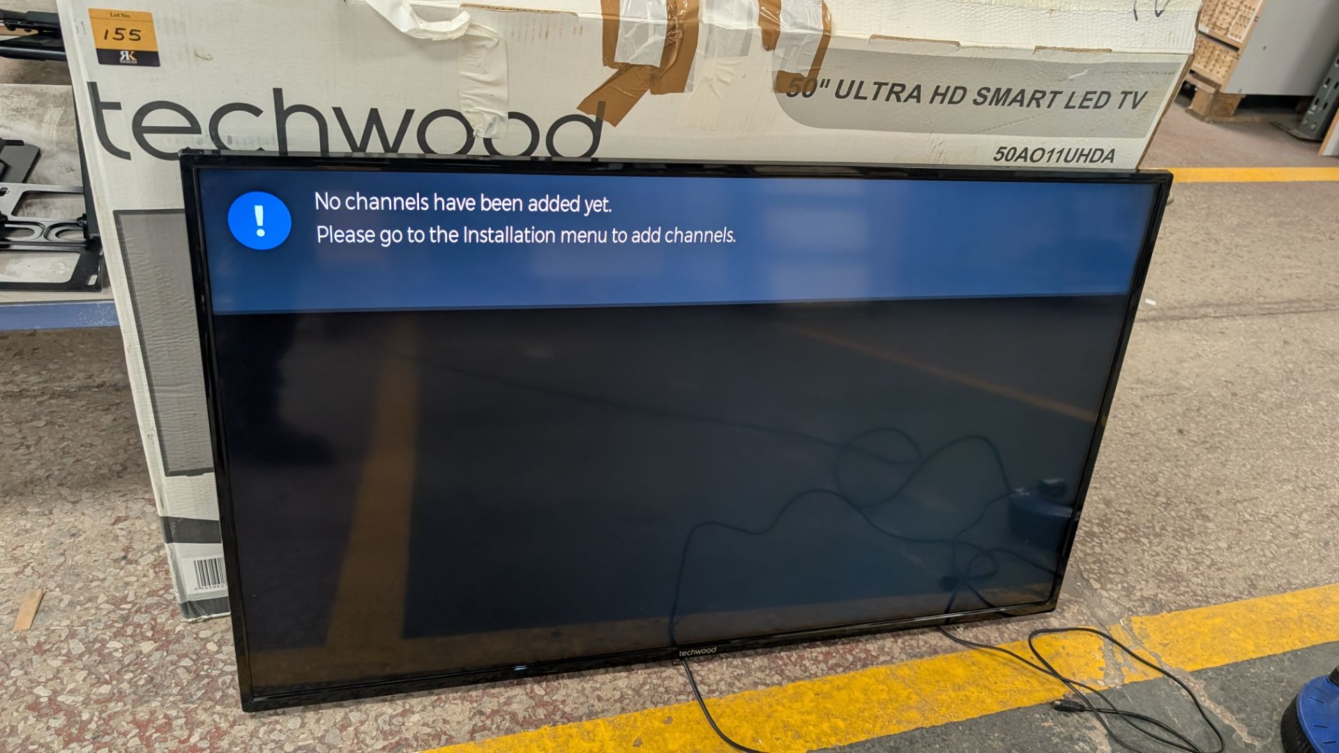 Techwood 50" Ultra HD Smart LED TV. Model: 50A011UHDA. Power cable and ...
