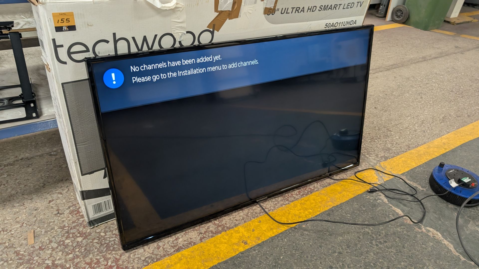 Techwood 50" Ultra HD Smart LED TV. Model: 50A011UHDA. Power cable and ...