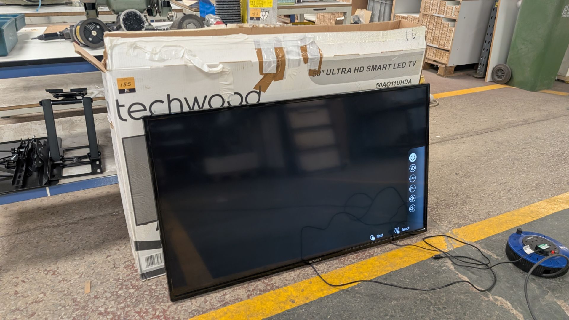 Techwood 50" Ultra HD Smart LED TV. Model: 50A011UHDA. Power cable and ...