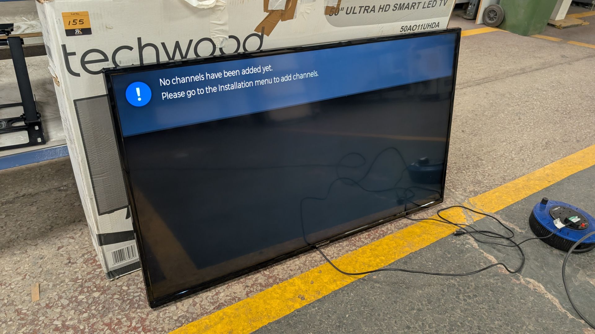 Techwood 50" Ultra HD Smart LED TV. Model: 50A011UHDA. Power cable and ...