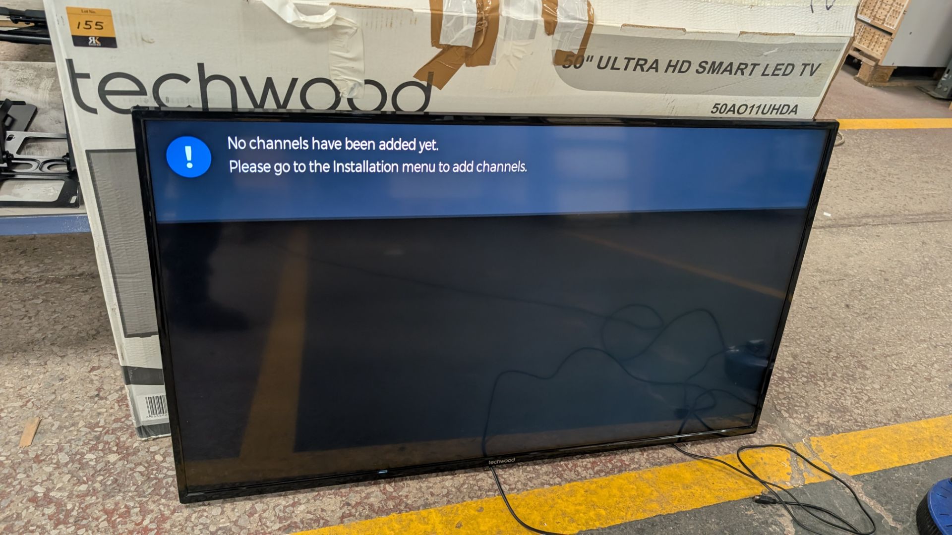 Techwood 50" Ultra HD Smart LED TV. Model: 50A011UHDA. Power cable and ...