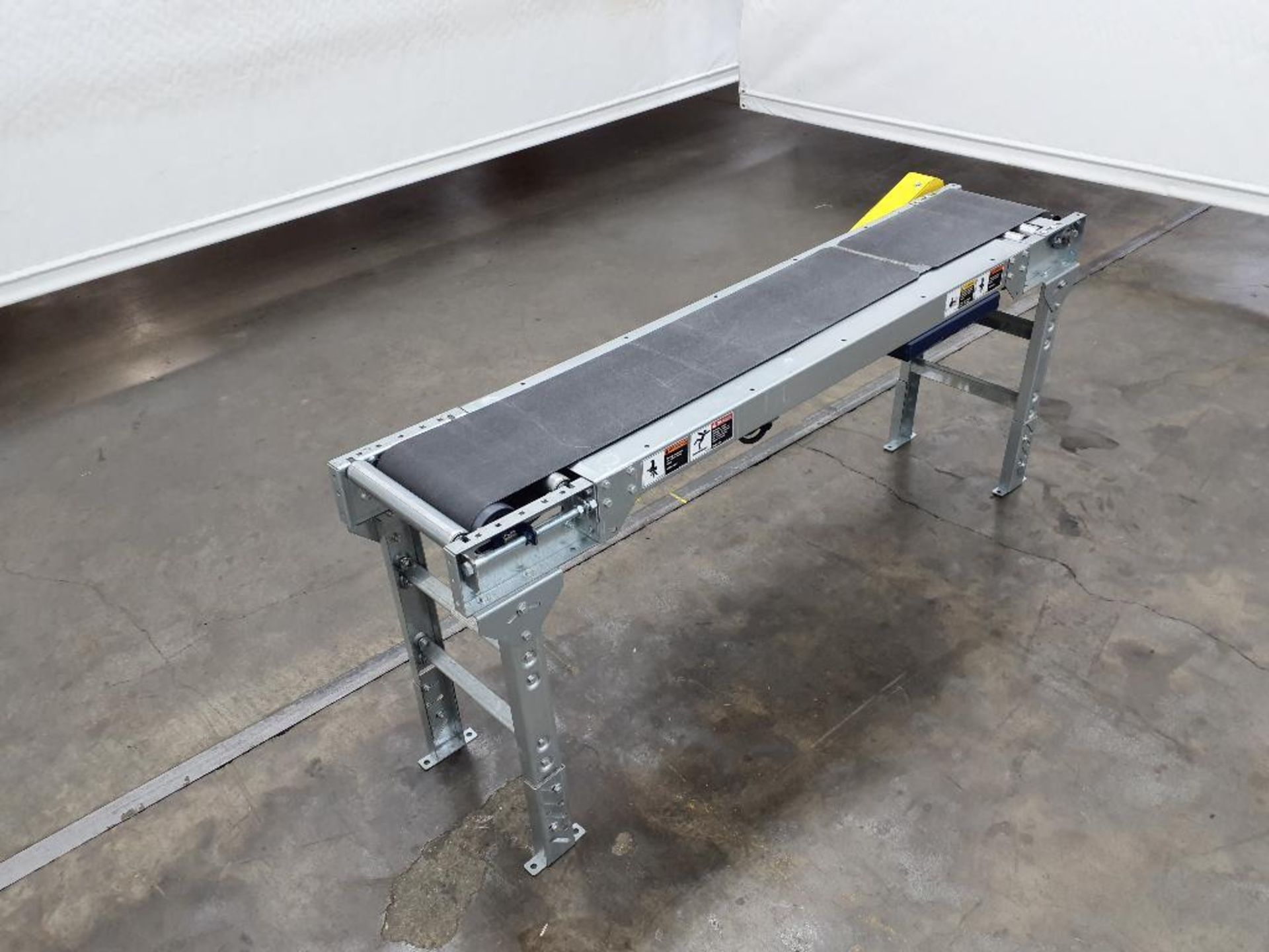This 12" Wide x 80" Long Smooth Top Conveyor is designed for efficient ...