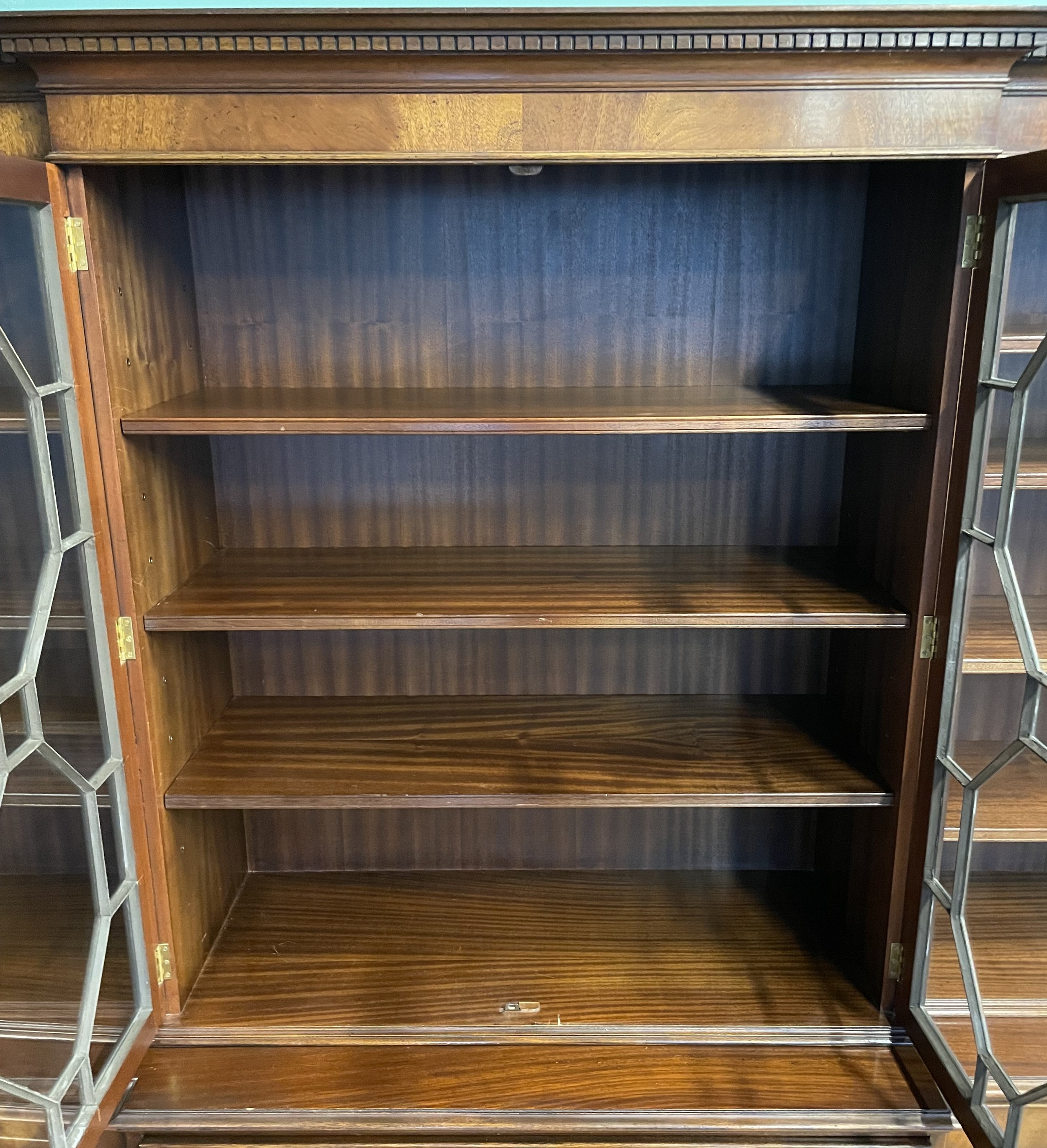 A Bevan Funnell Reprodux Georgian style flame mahogany breakfront ...