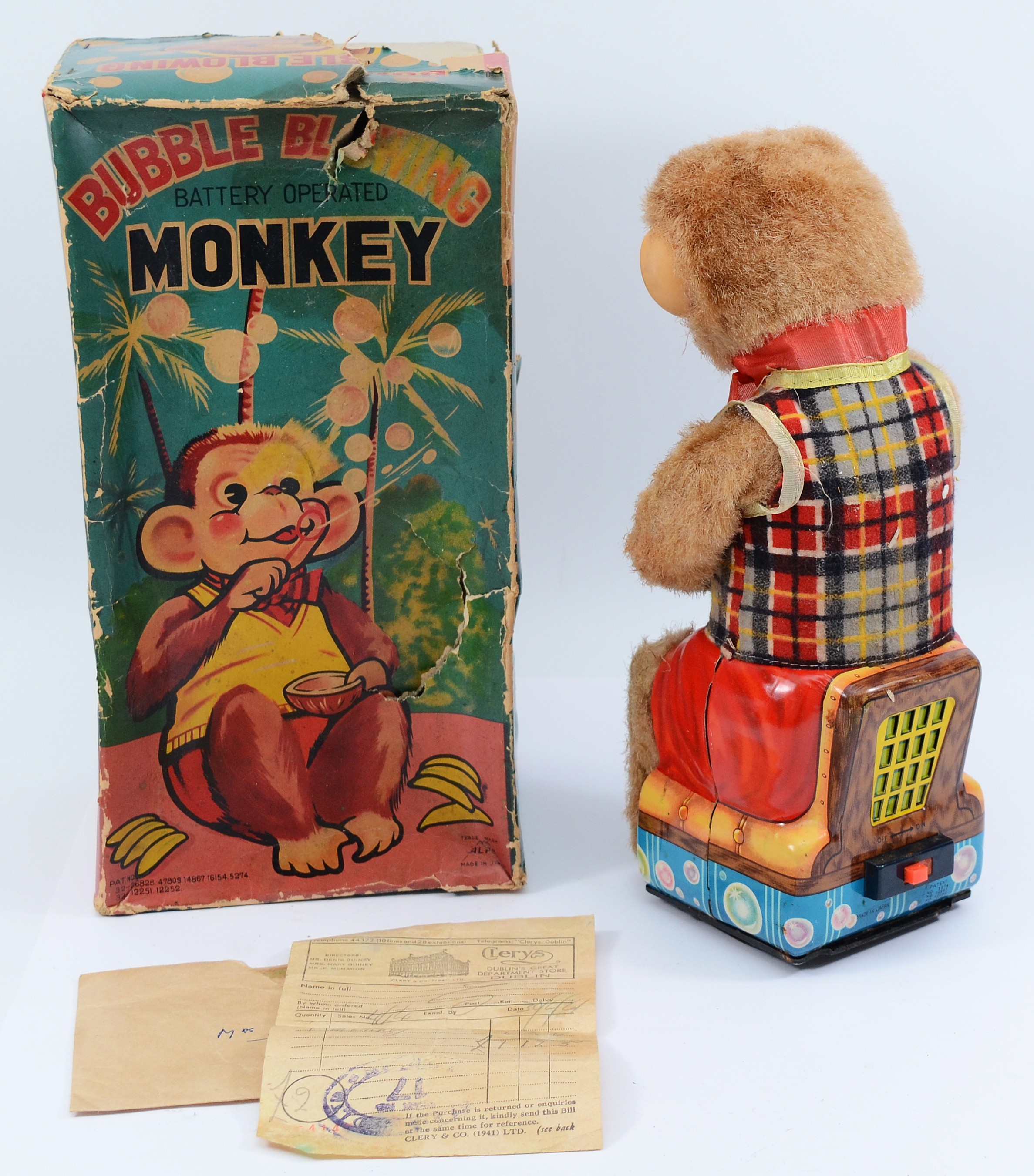 A 1950s battery operated bubble blowing monkey toy with lighted eyes ...