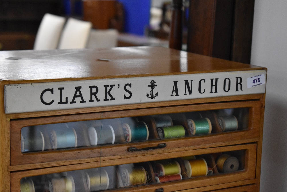 A vintage cotton reel display for Clark's Anchor , having seven divided ...