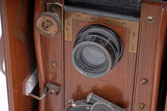A collection of three Edwardian plate cameras, comprising: a quarter ...