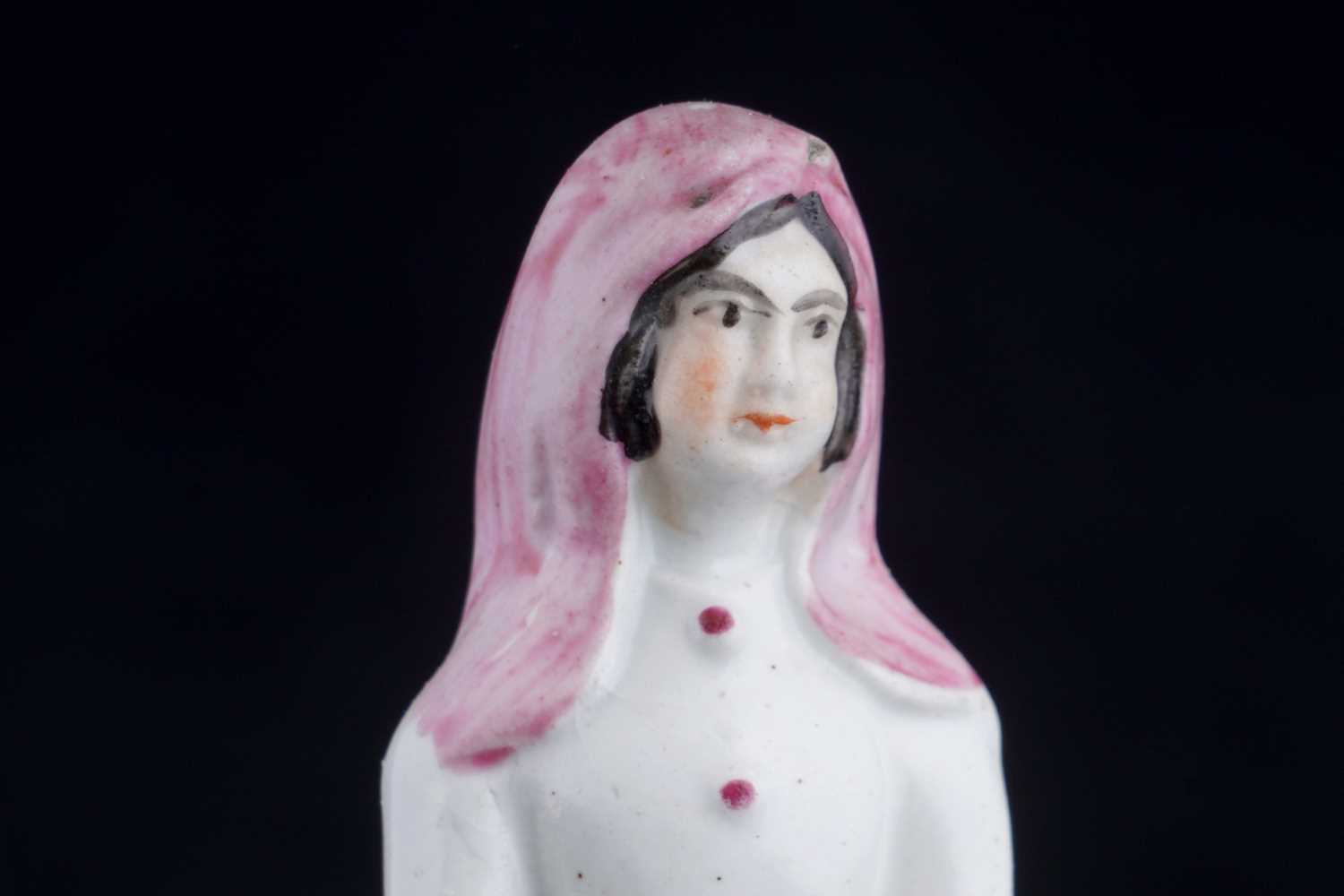 A rare Staffordshire figure of Lady Isabel Burton riding a camel, 21cms.
