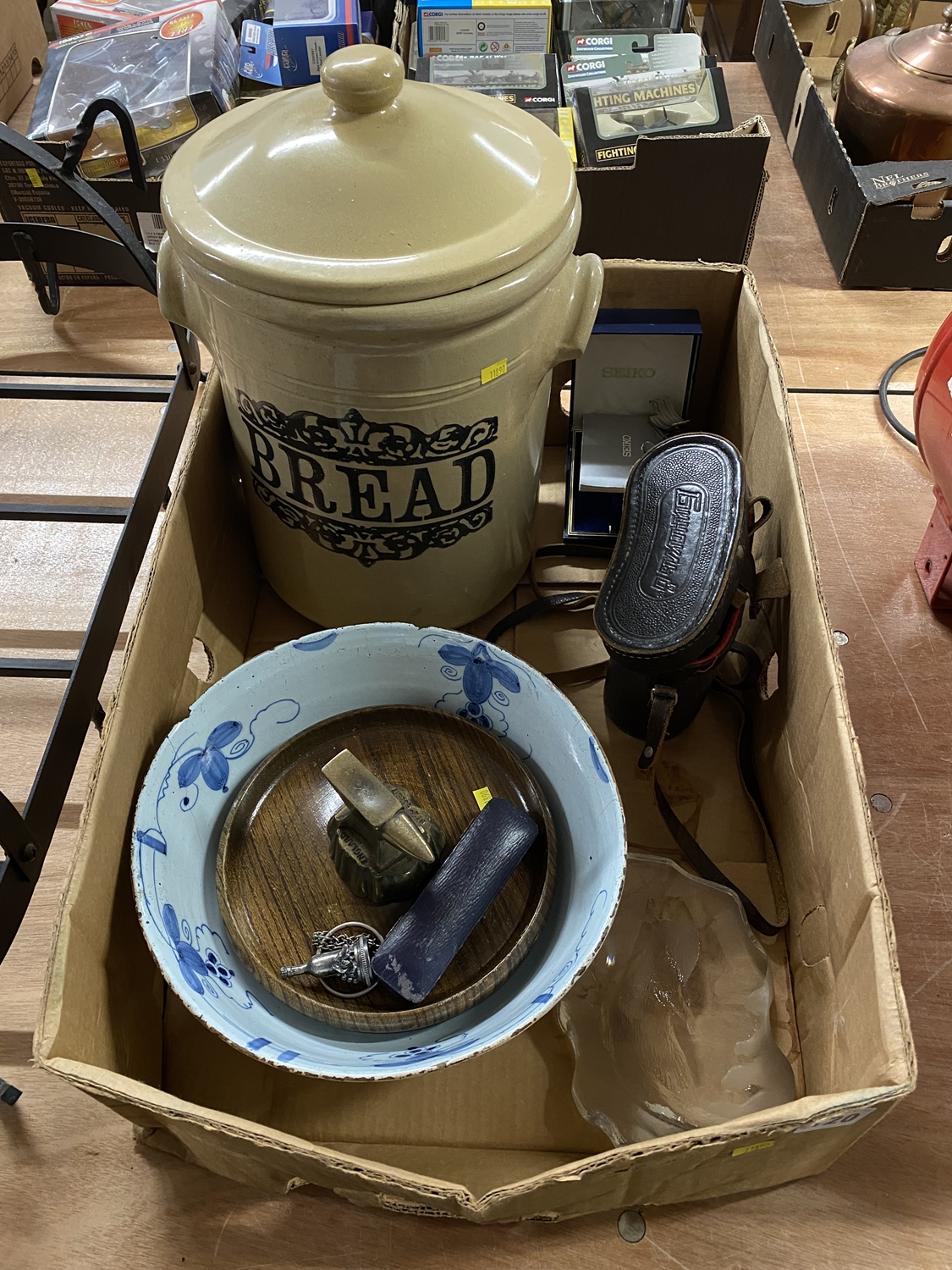 A stoneware lidded bread bin, a blue and white footed bowl, binoculars ...