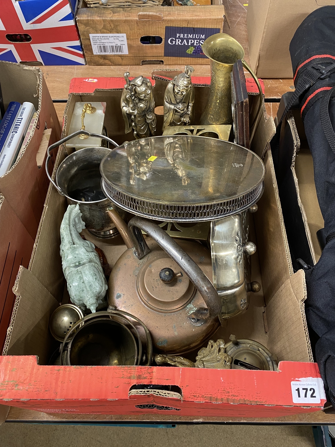 A box of metalware, copper kettle, soapstone horse study, onyx mantle ...