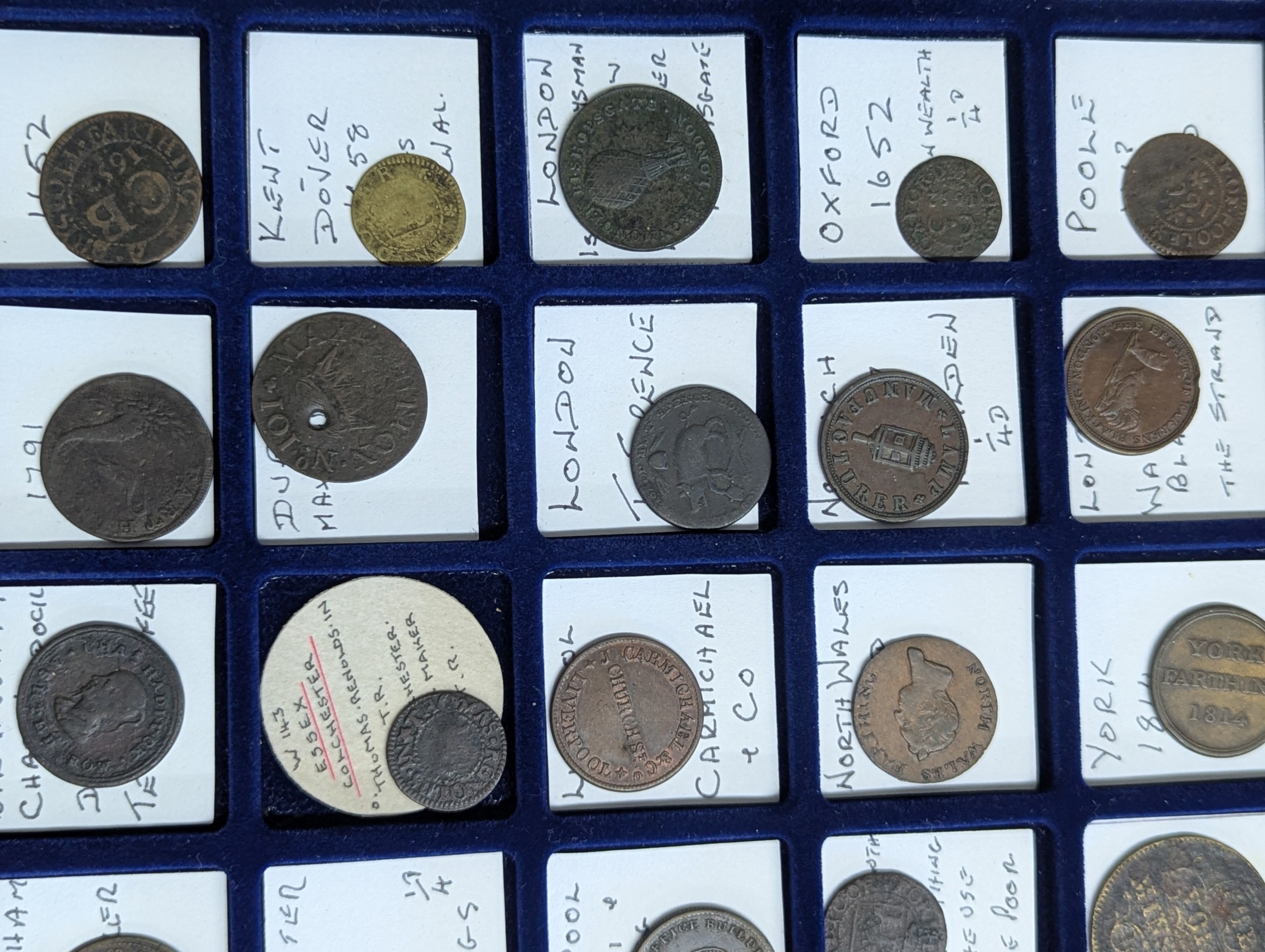 A collection of 28th 17th century and later British tokens to include ...