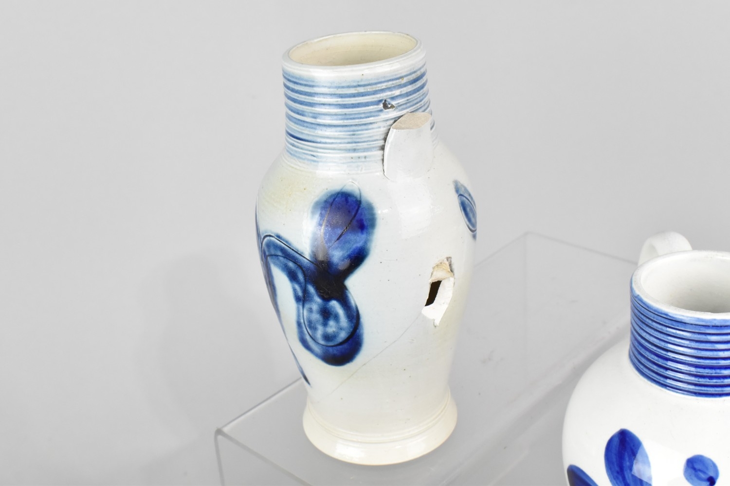 A Collection of Salt Glazed Stonewares to Comprise "Scratch Blue" Jug ...