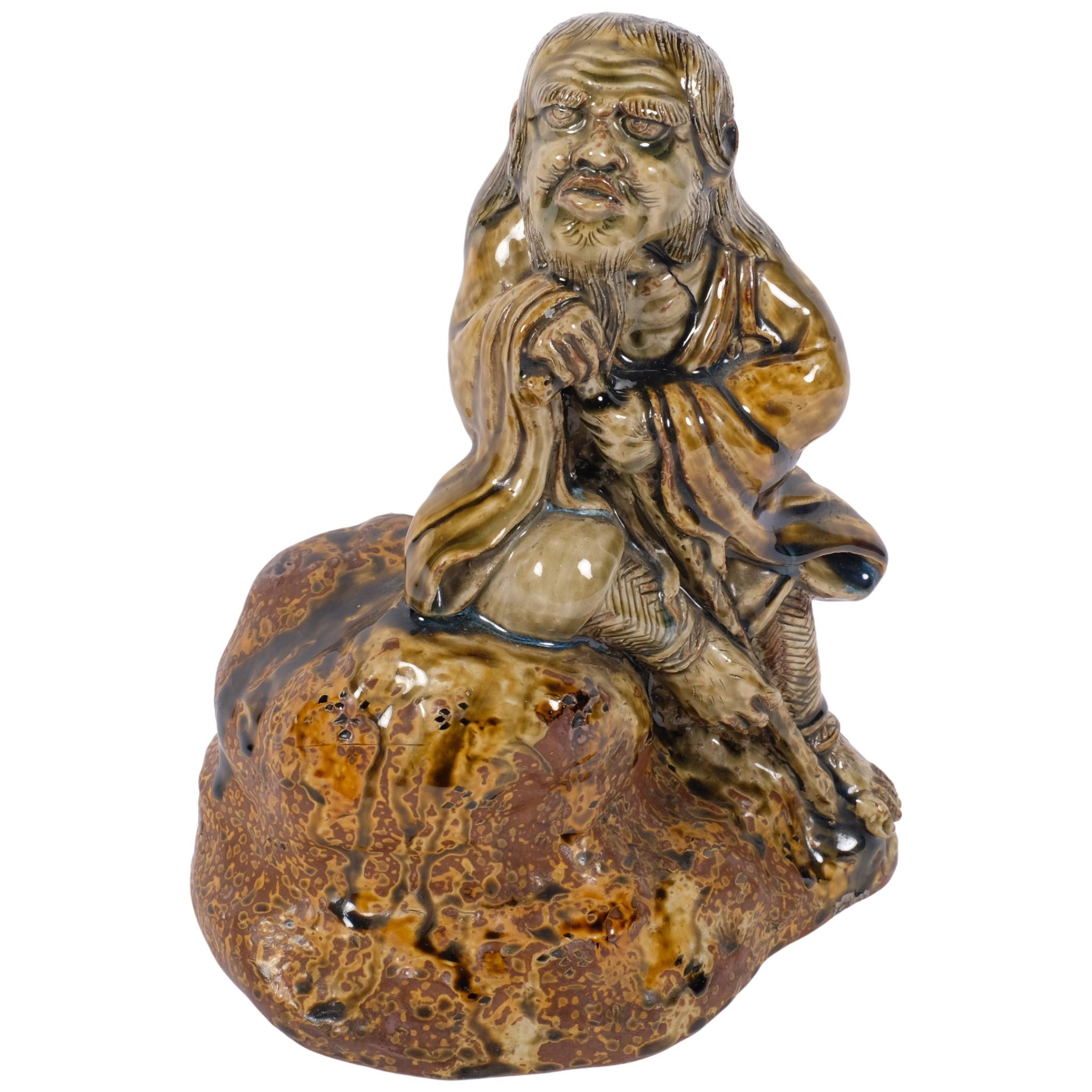 A Chinese porcelain figure of Shou Lao, hand modelled with translucent ...