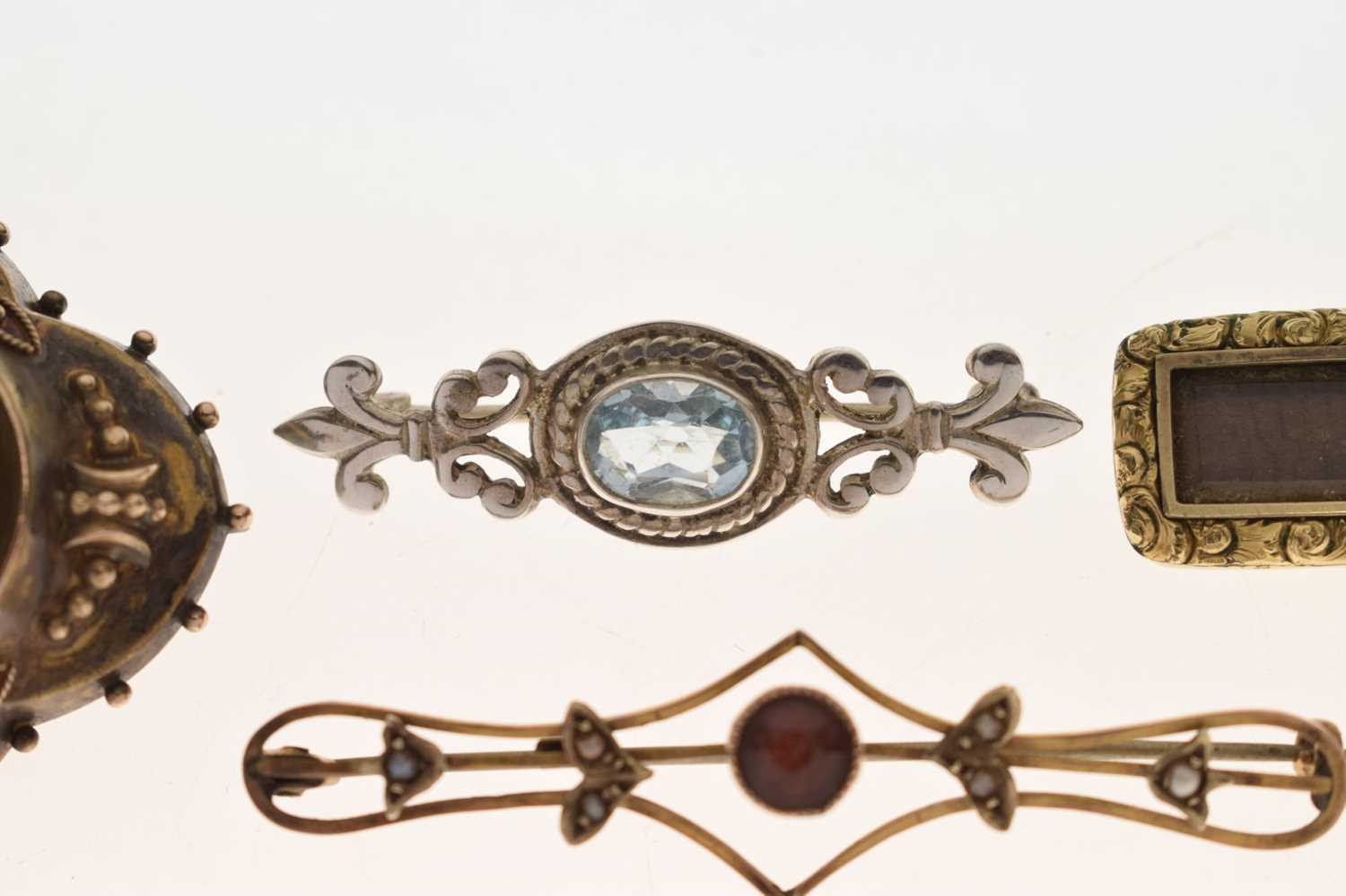 Four assorted brooches: comprising a Victorian turquoise brooch, a ...