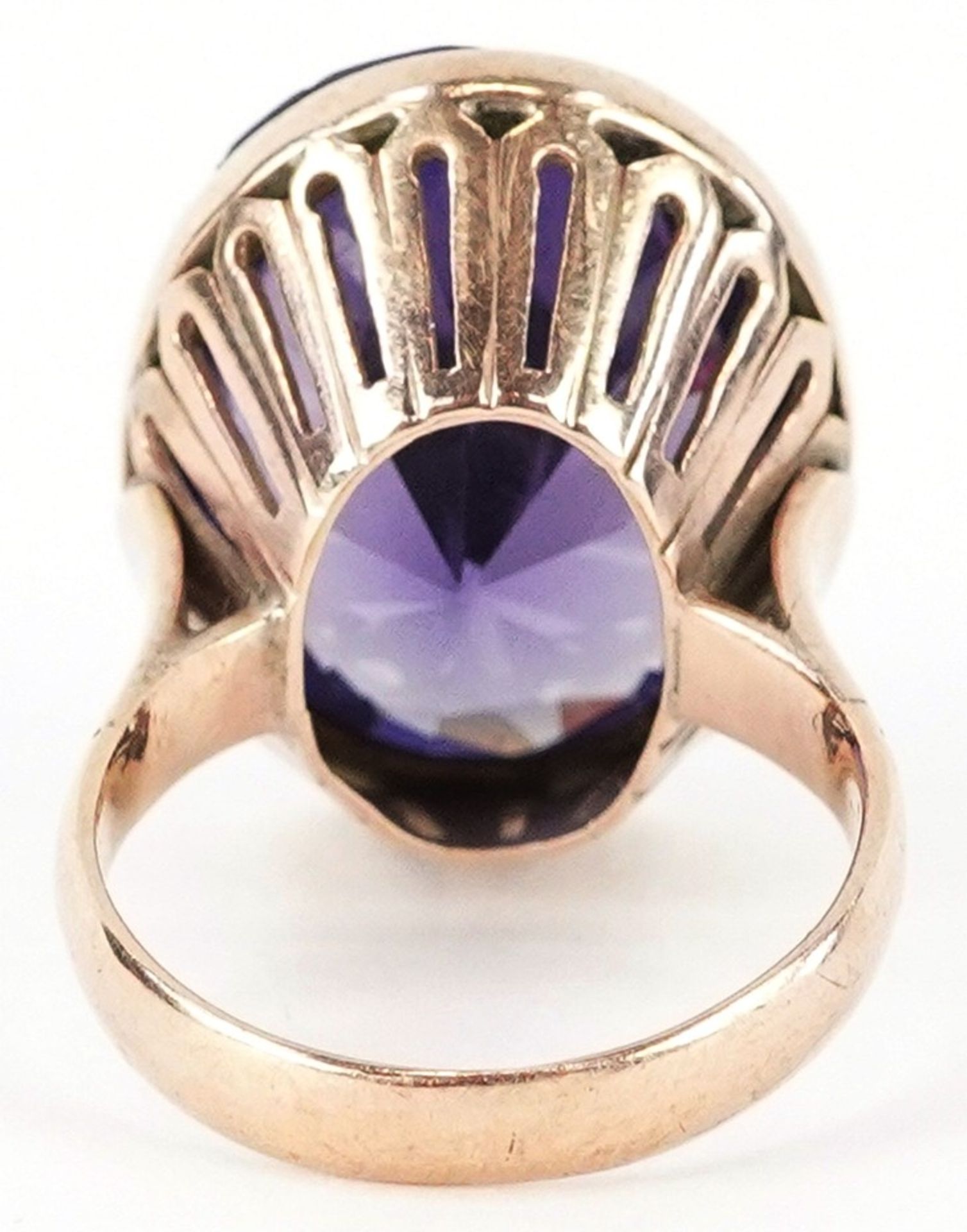 A 14K gold blue/purple stone solitaire ring, tests as sapphire, size M ...