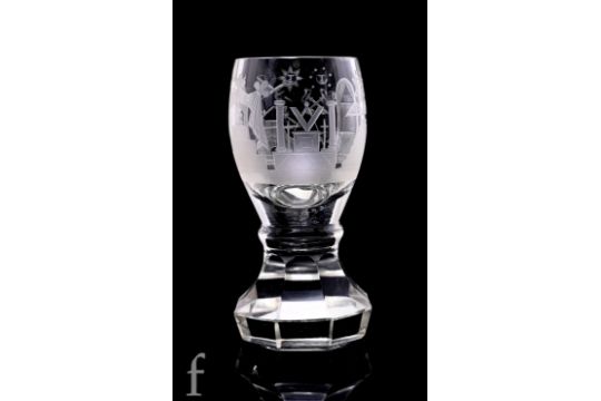 A 19th Century Masonic goblet, the ovoid bowl engraved with a ...