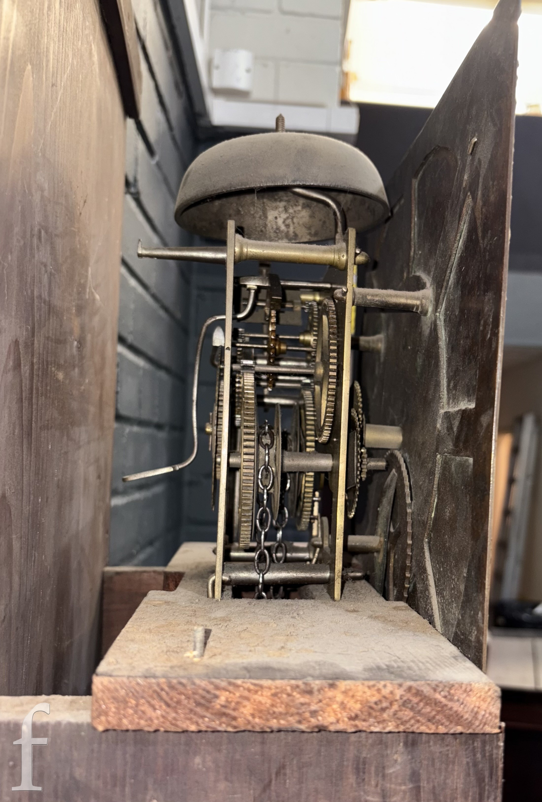 An 18th Century oak longcase clock with 30-hour movement striking on a ...