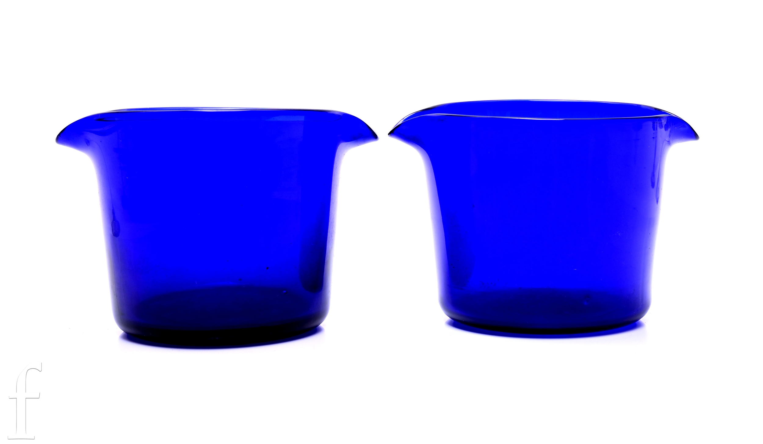 A pair of late Georgian Bristol blue table rinsers, each of cylindrical ...