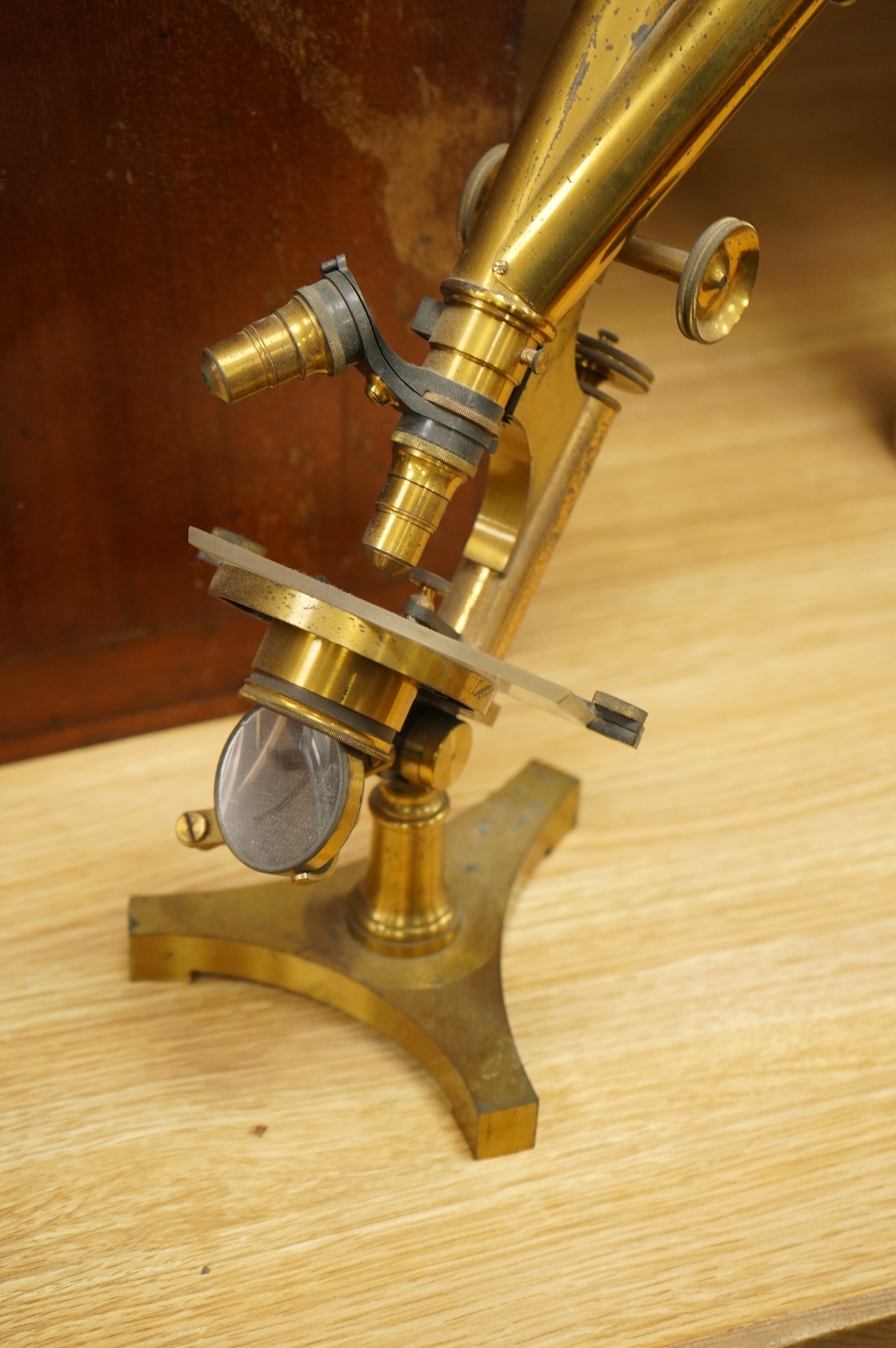 A late 19th century brass compound binocular microscope, by R. & J ...
