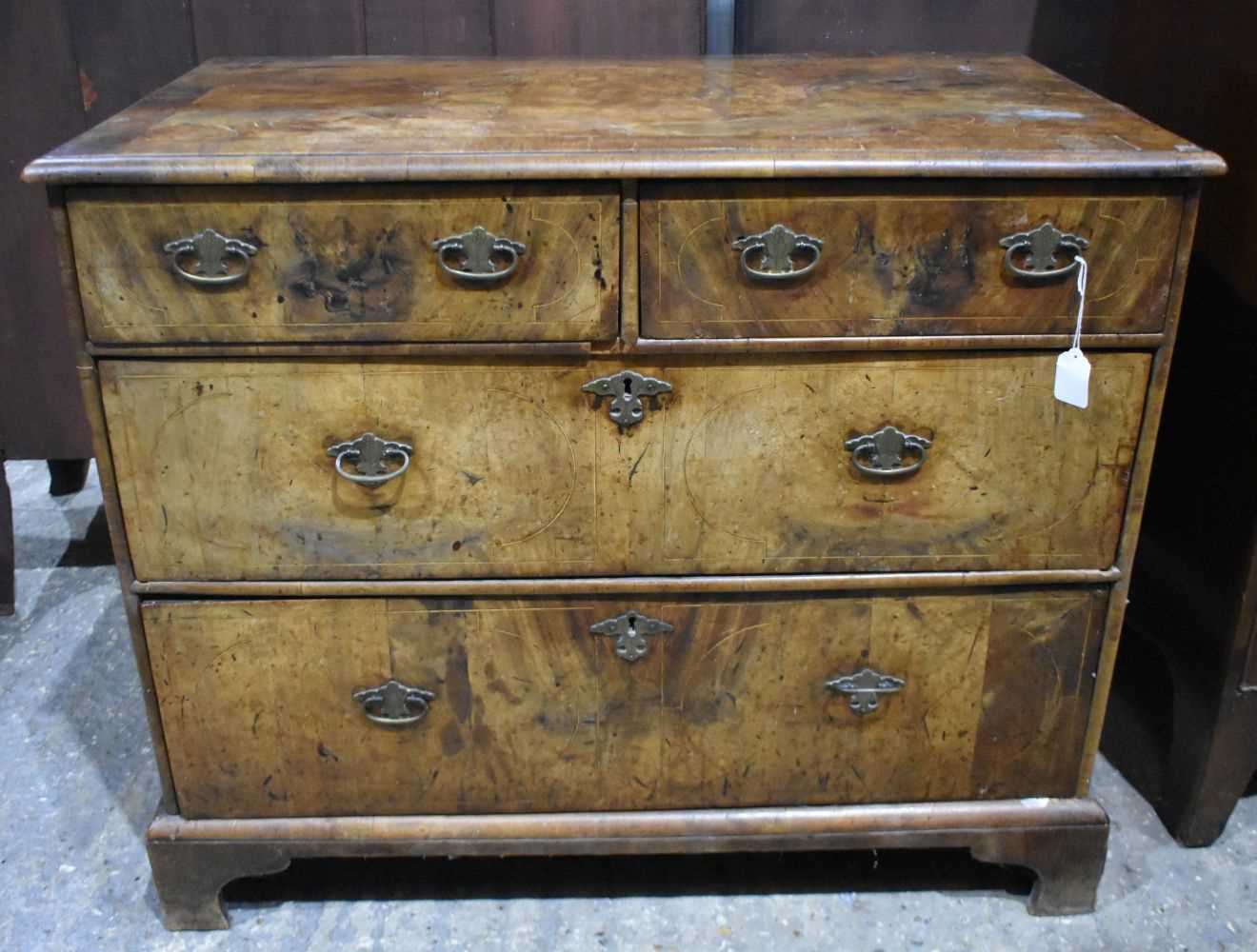 A George III Walnut chest of drawers finely inlaid to the top 76 x 92 x ...
