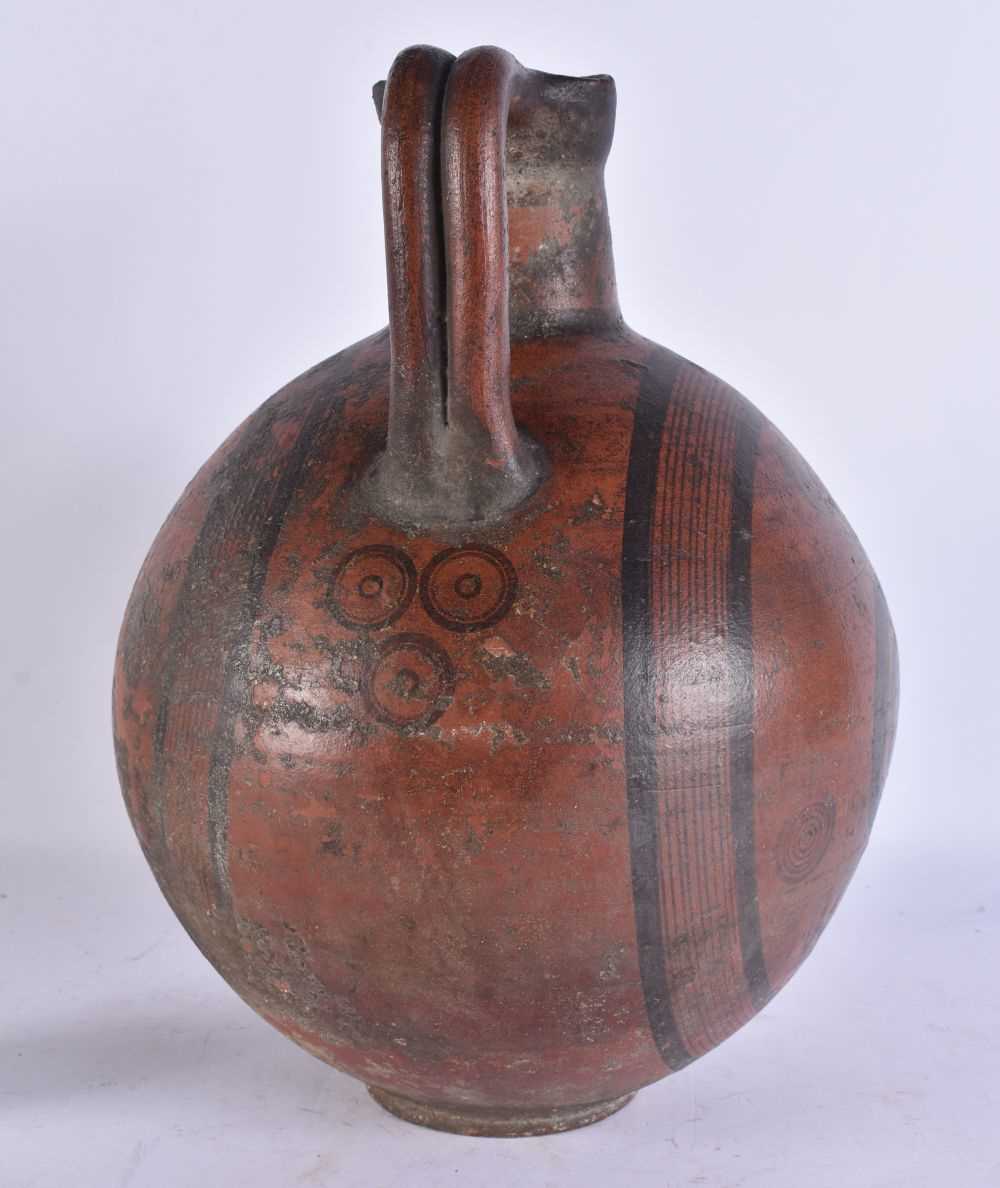 A LARGE ANCIENT CYPRIOT BLACK ON RED POTTERY OENOCHOE the spherical ...