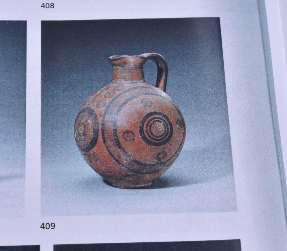 A LARGE ANCIENT CYPRIOT BLACK ON RED POTTERY OENOCHOE the spherical ...