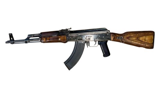 Kalashnikov 7.62mm AKM assault rifle and fitted magazine, serial number ...