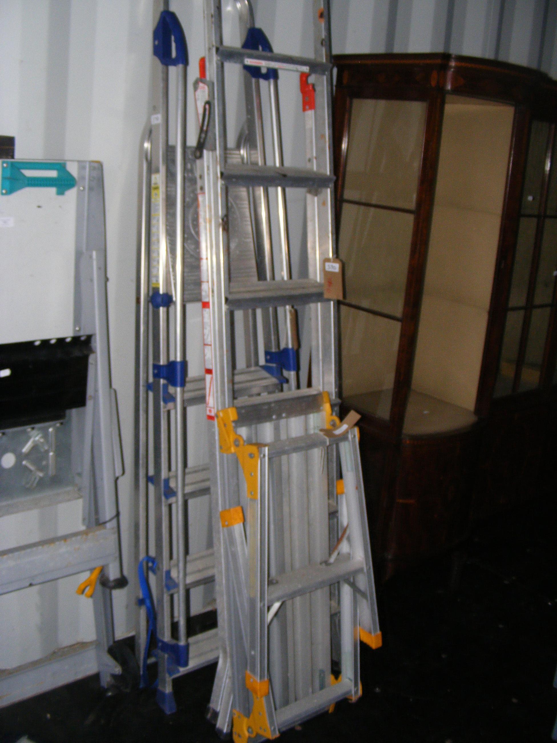 Two ladders together with a decorators platform