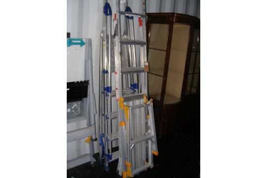 Two ladders together with a decorators platform