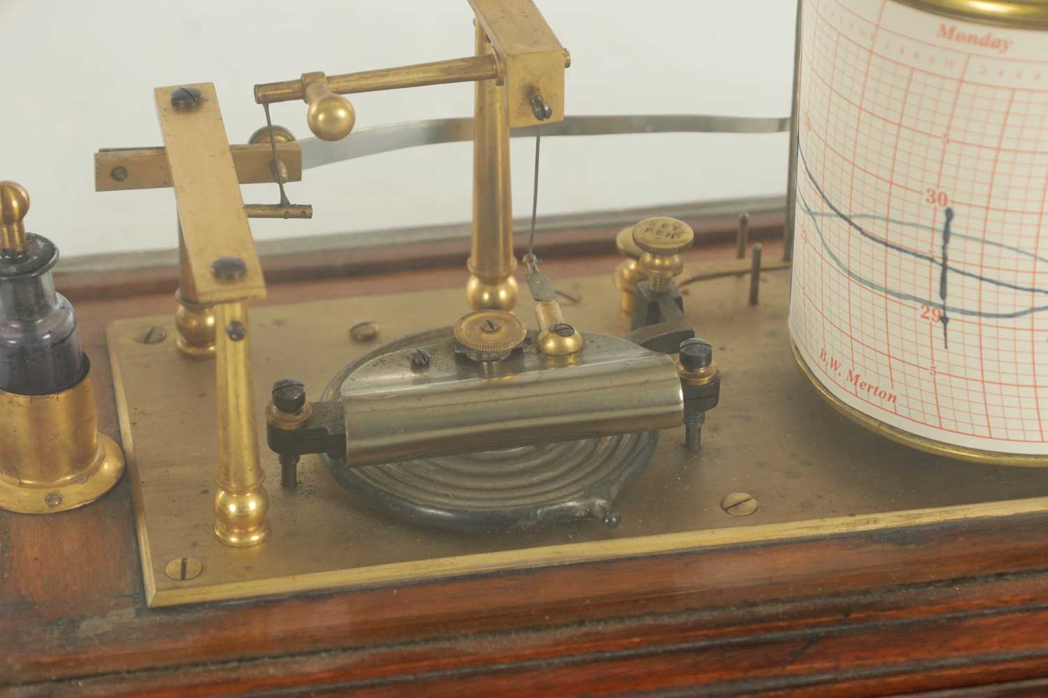 A 19TH CENTURY MAHOGANY BARAGRAPH with glazed moulded case having a ...