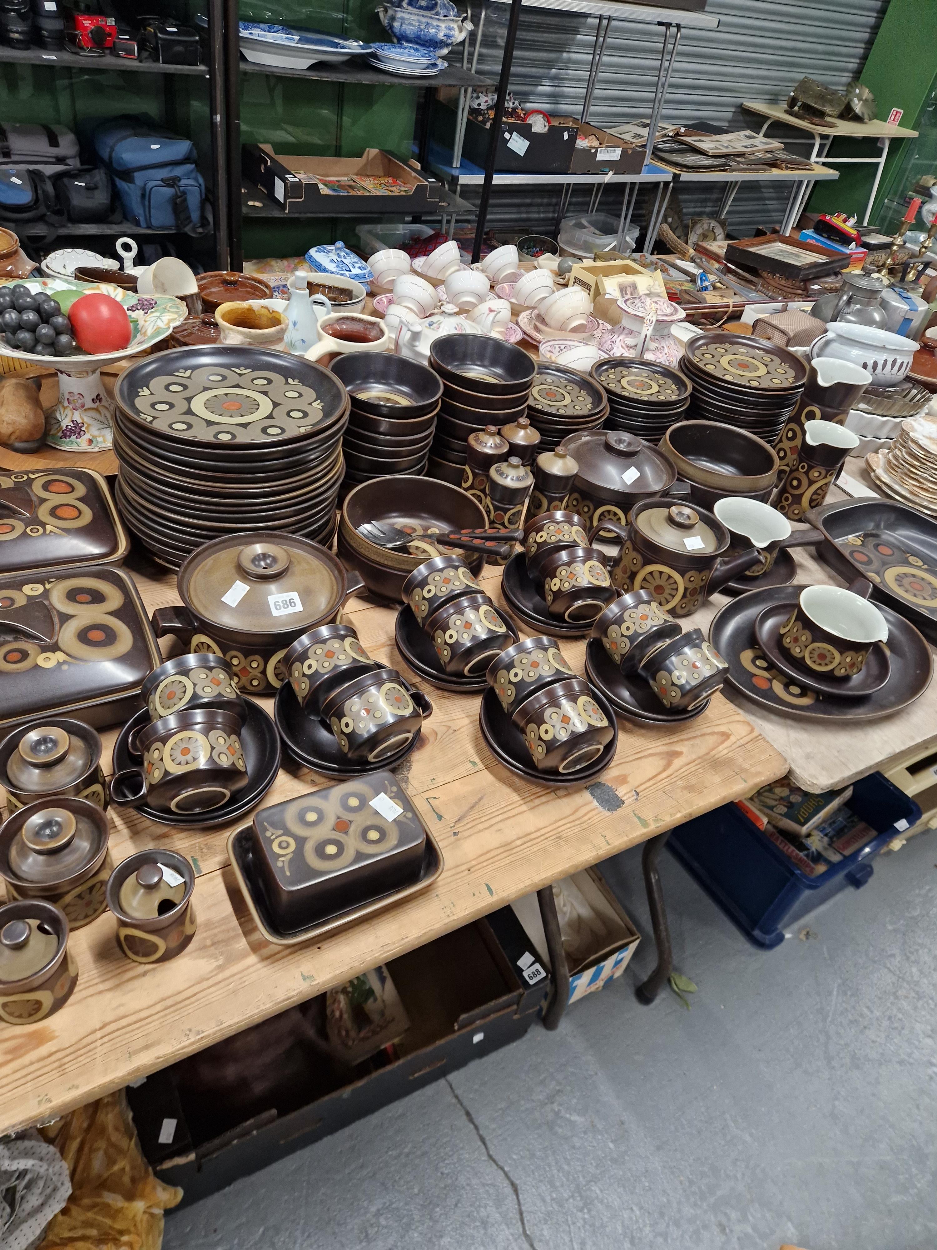 An extensive service of Denby brown stonewares