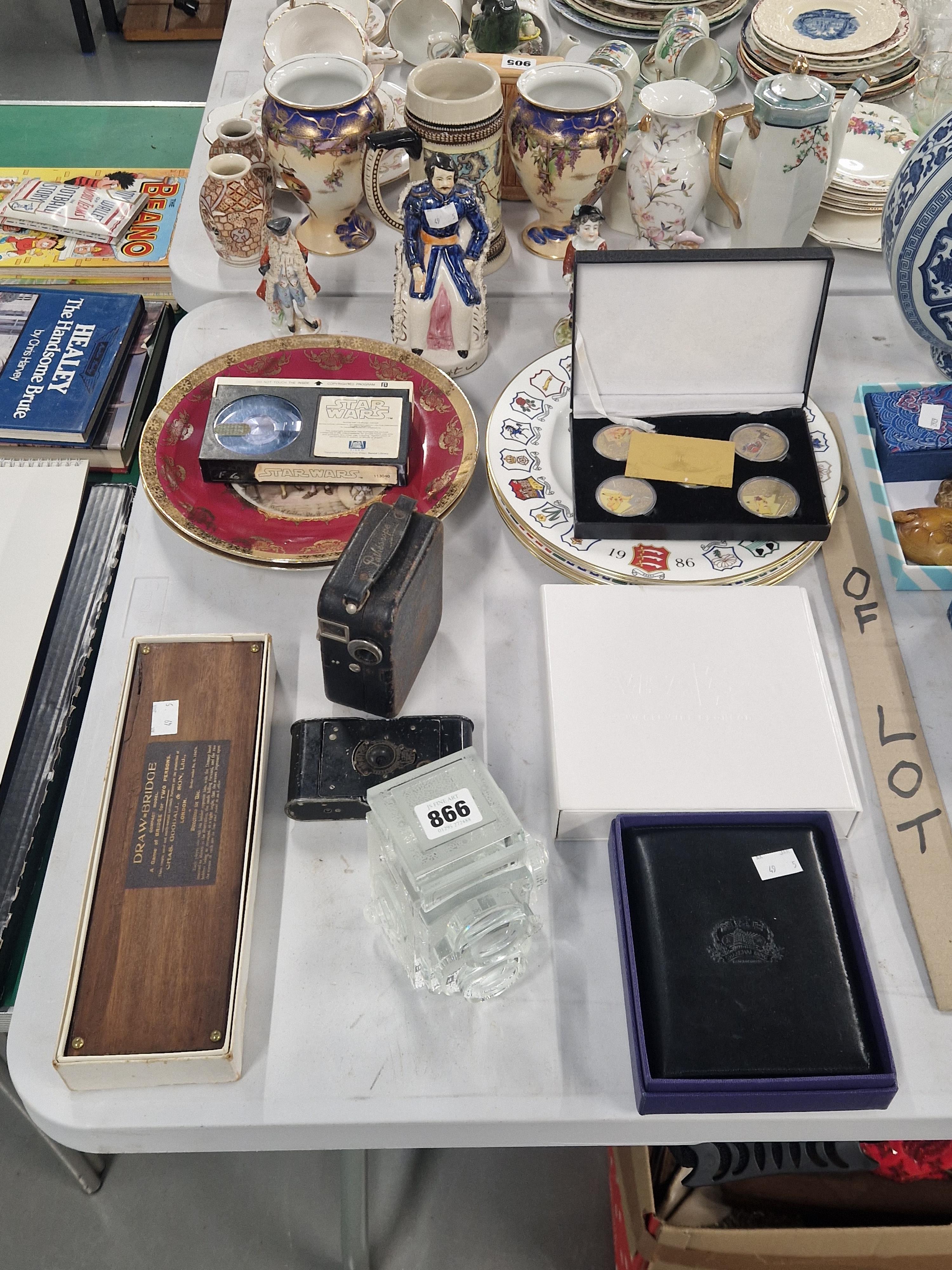 1980s county cricket plates, a glass camera, two real cameras ...
