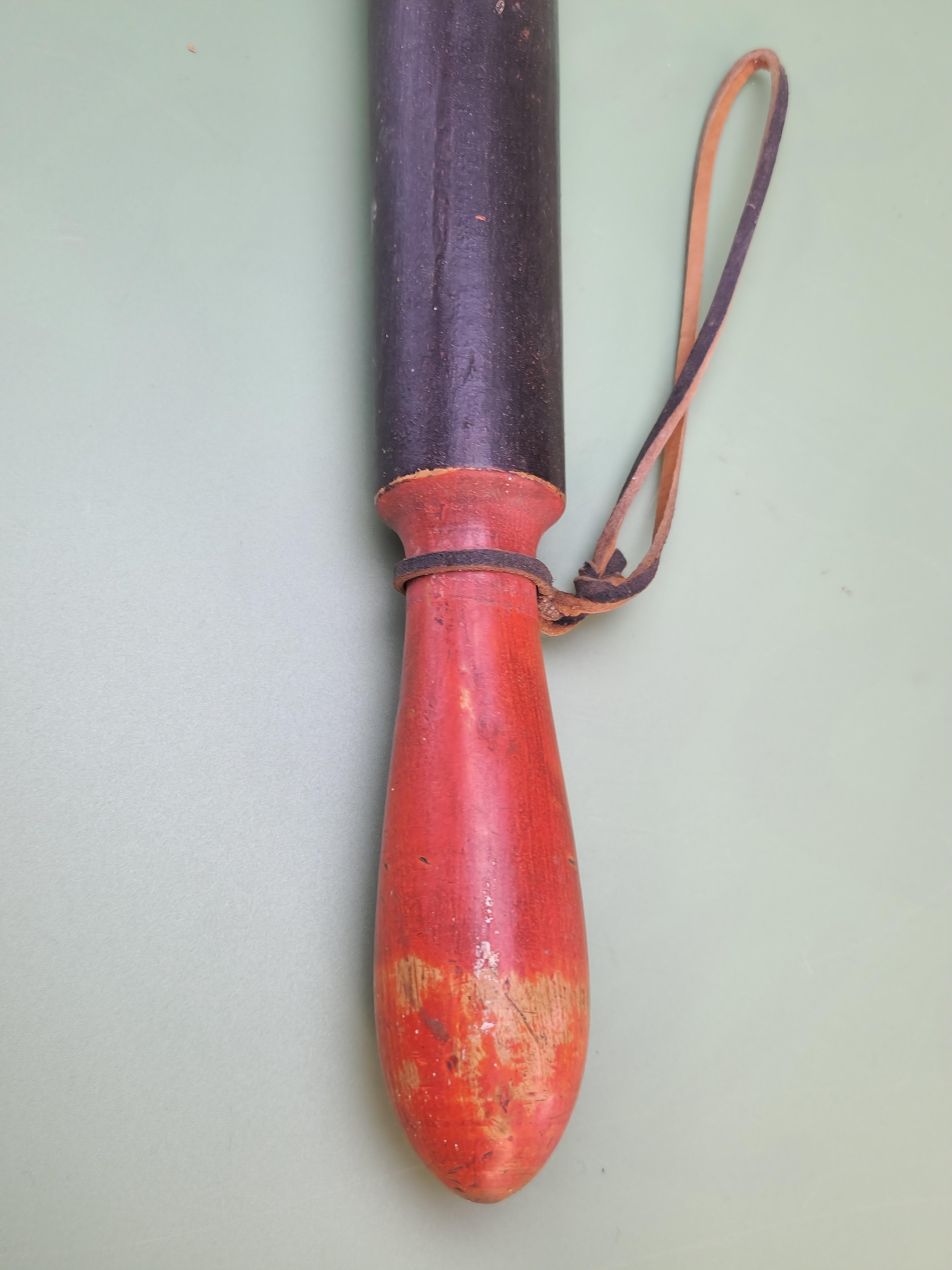 A William III truncheon, the black ground painted with his crowned cypher